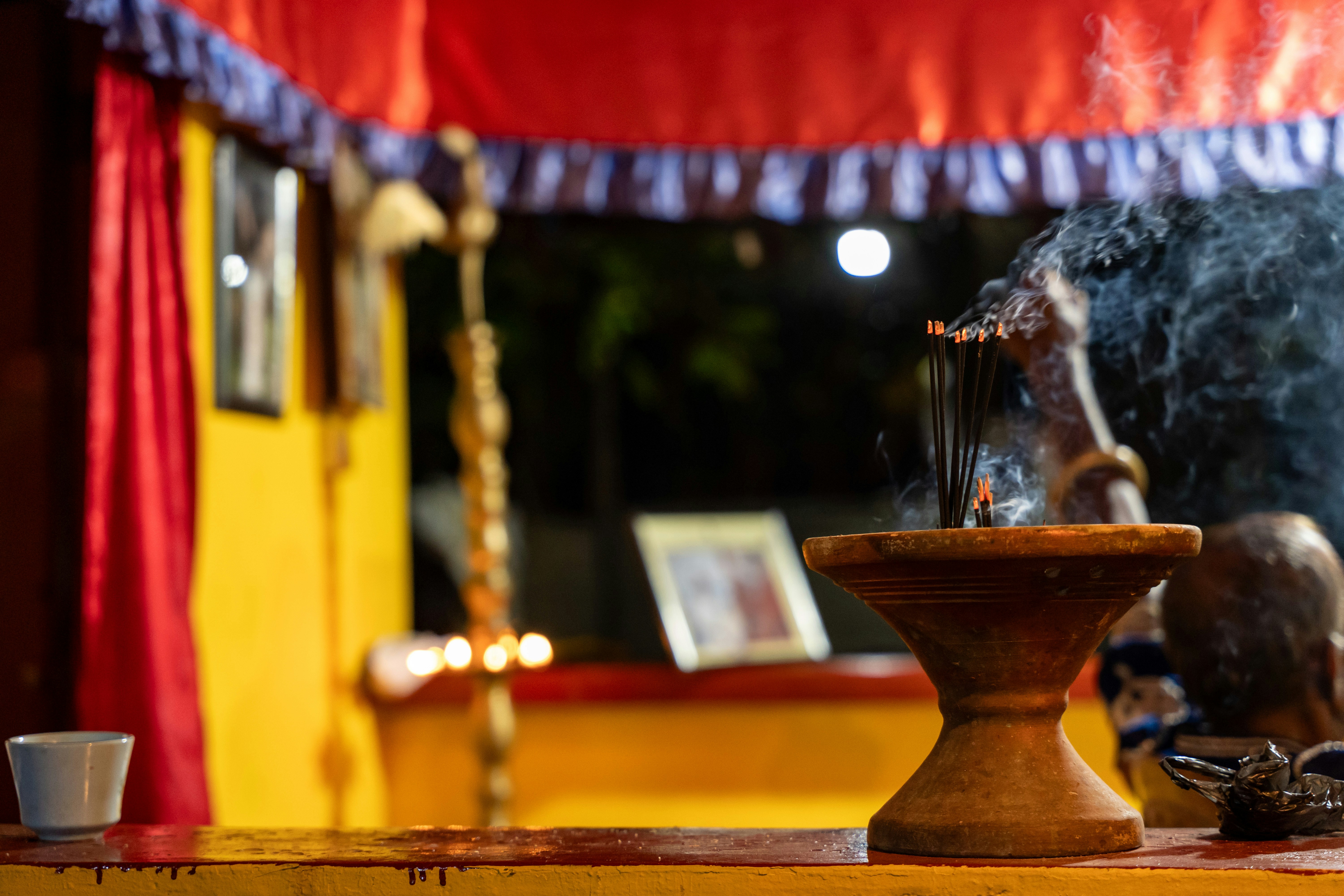 Incense and Glow: A Worship Scene at the Shrine