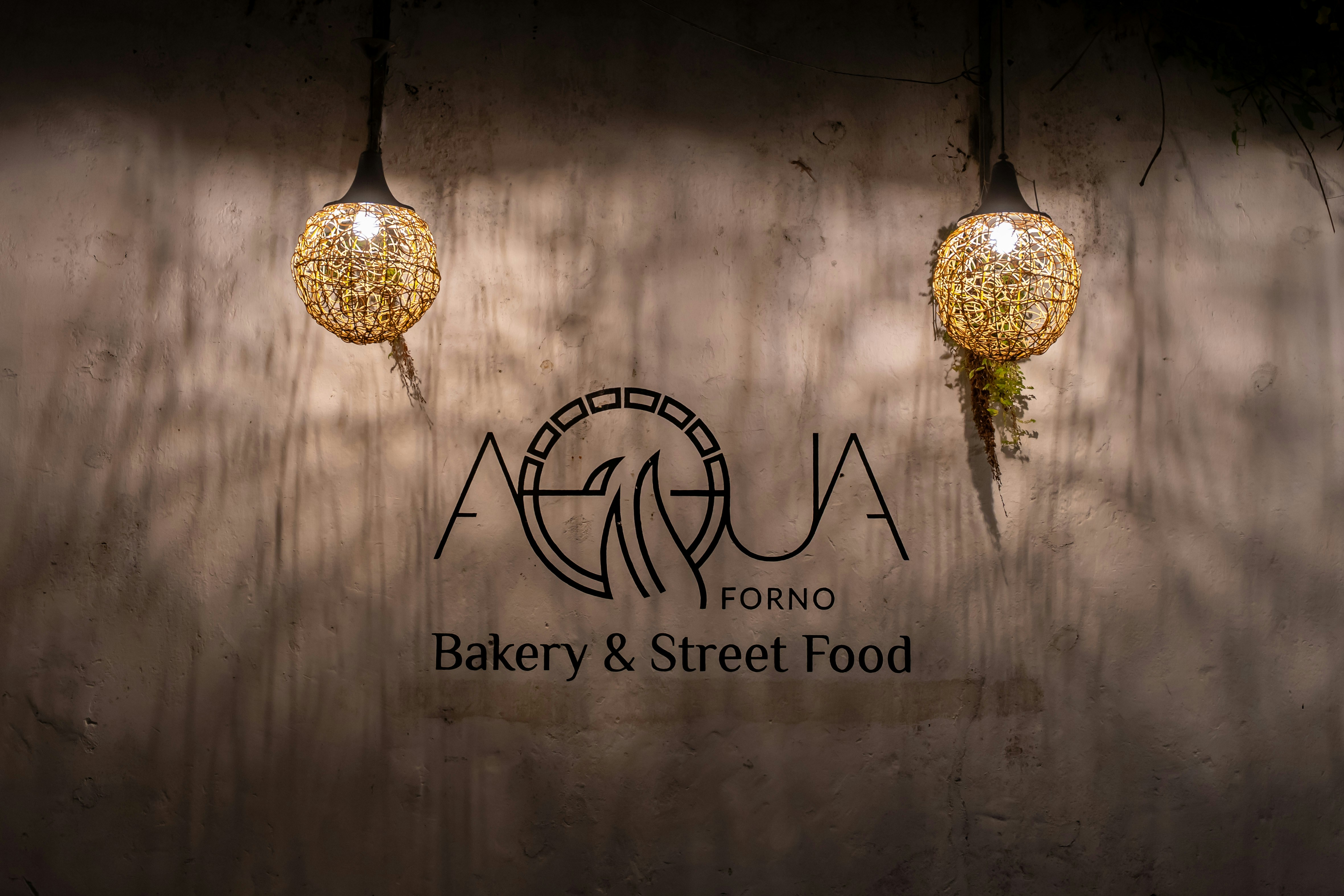 Glowing Orbs over a Quiet Bakery Facade