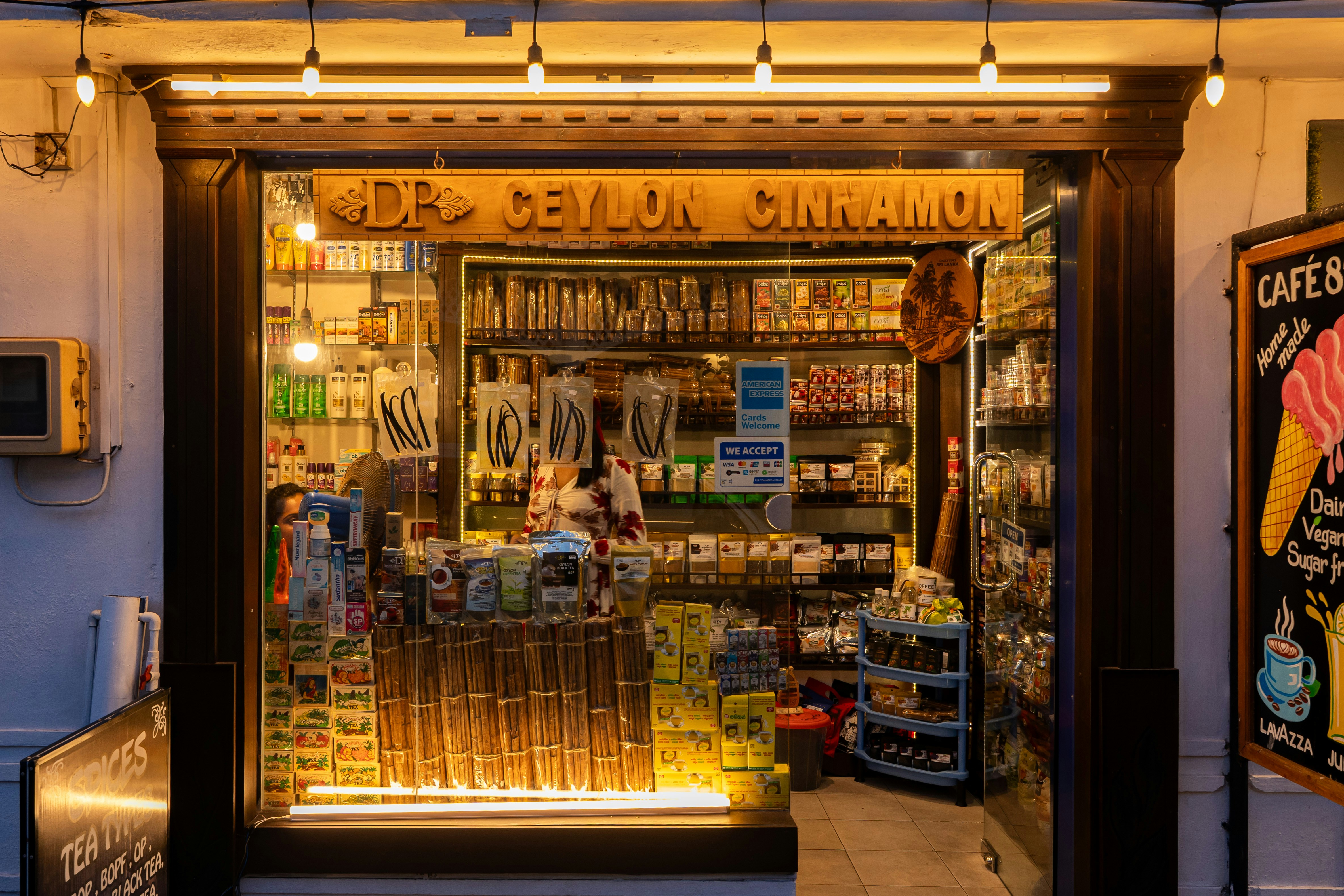 Saffron Glow: An Open-Air Shopfront Laden with Spices and Lantern Light