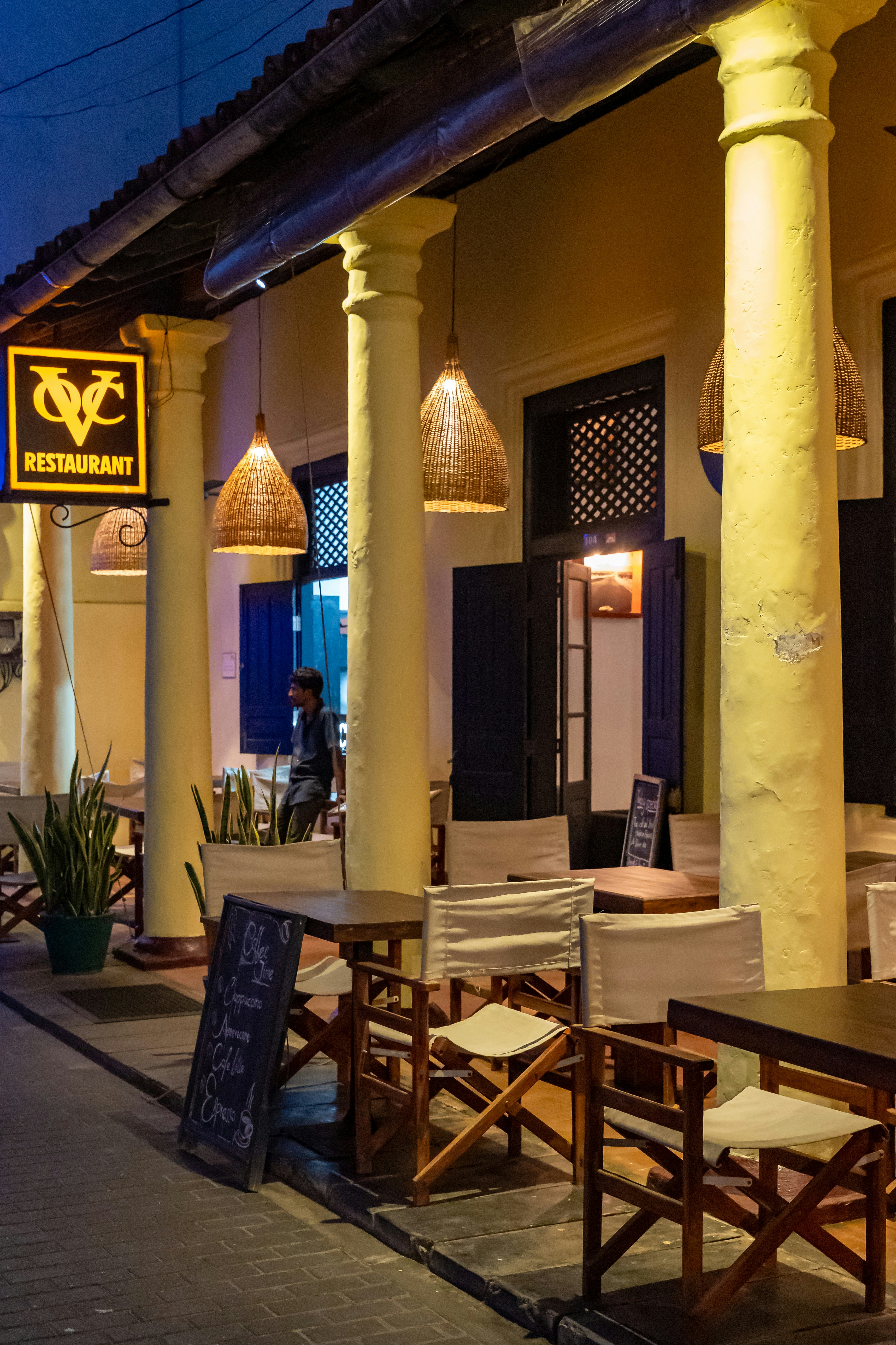 Evening at the Veranda: A Warm Hue of Columns and Lanterns