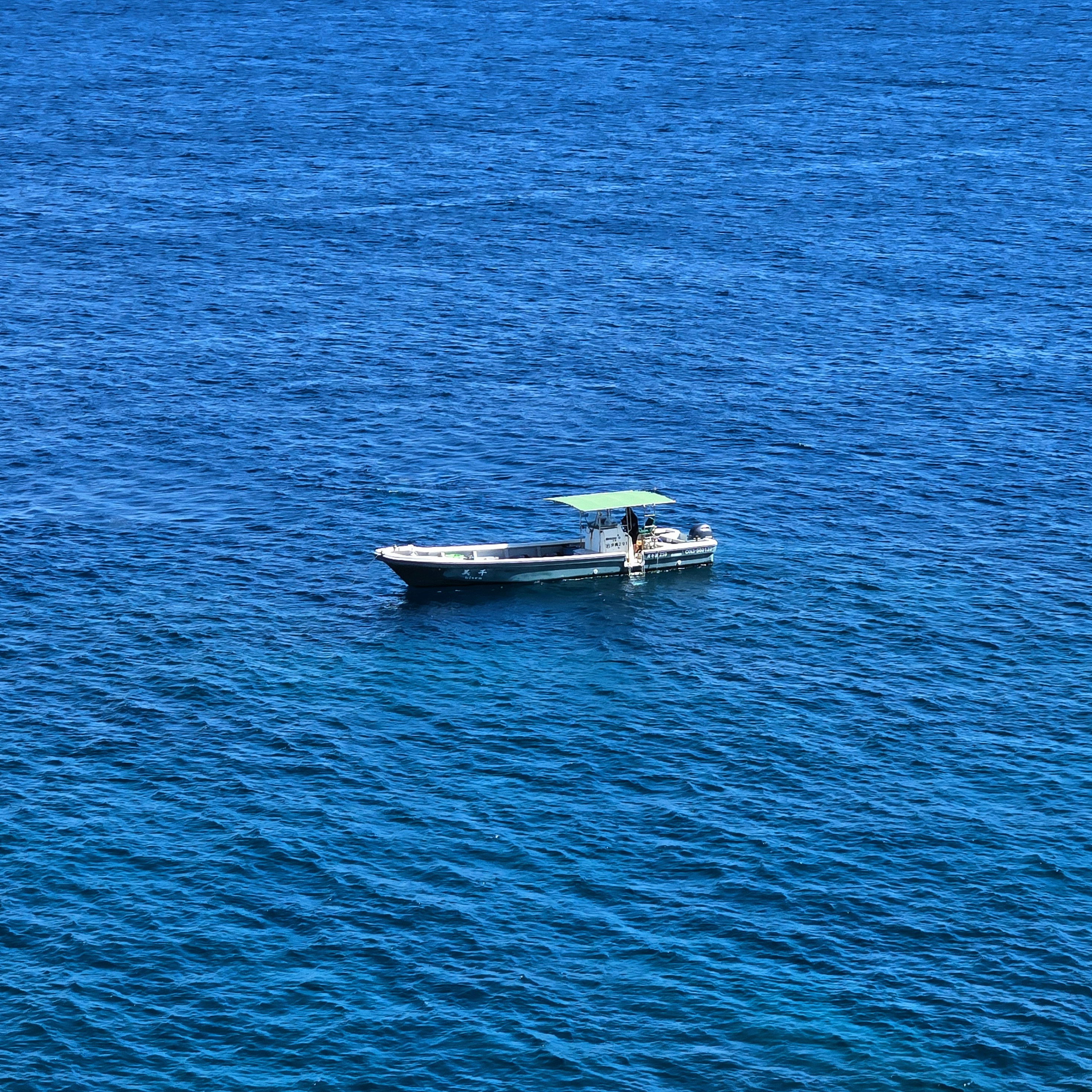 Solitary Boat on Azure Quiet
