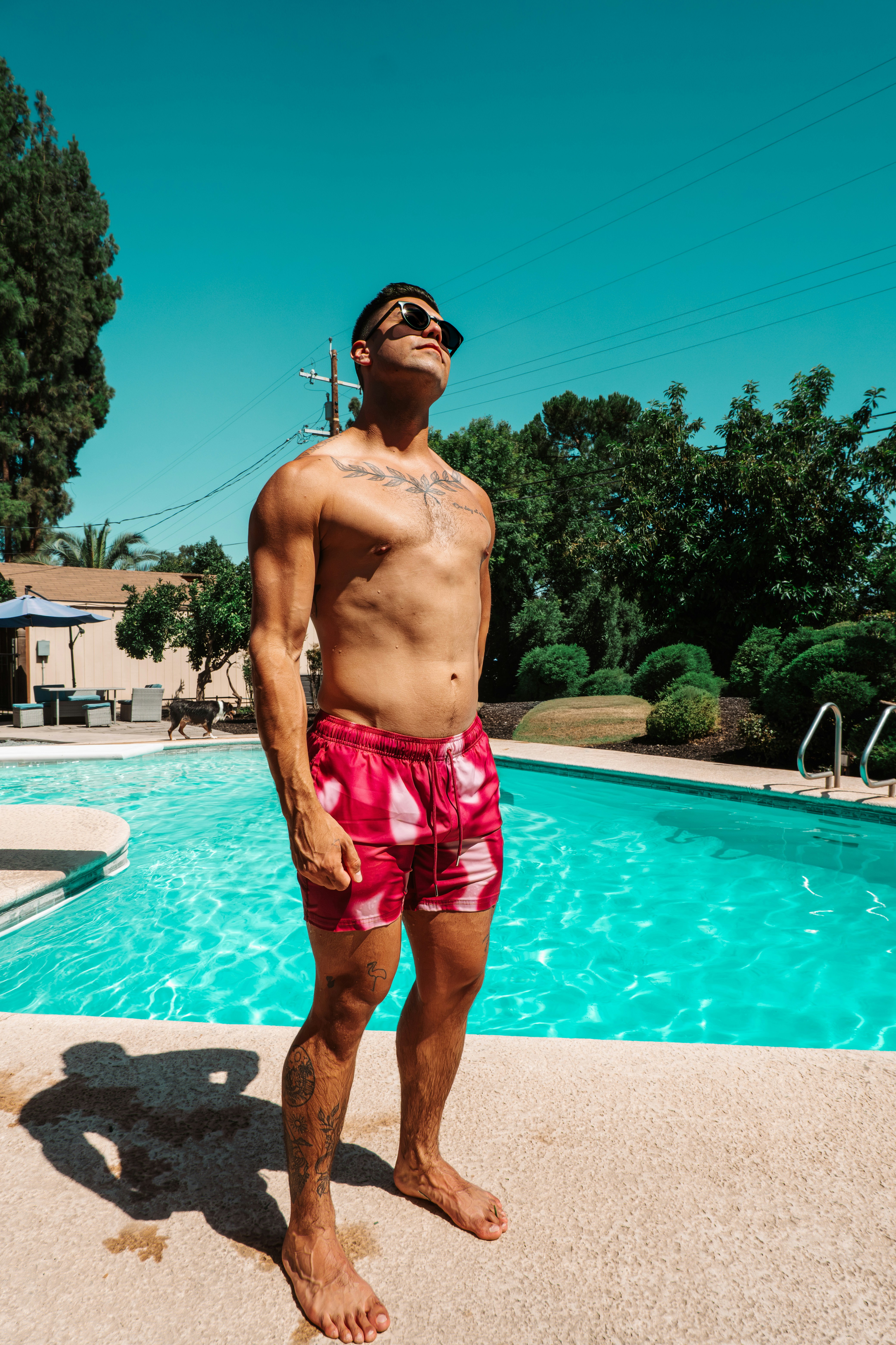 Sunlit Strength: A Hard-Edge Portrait by the Pool