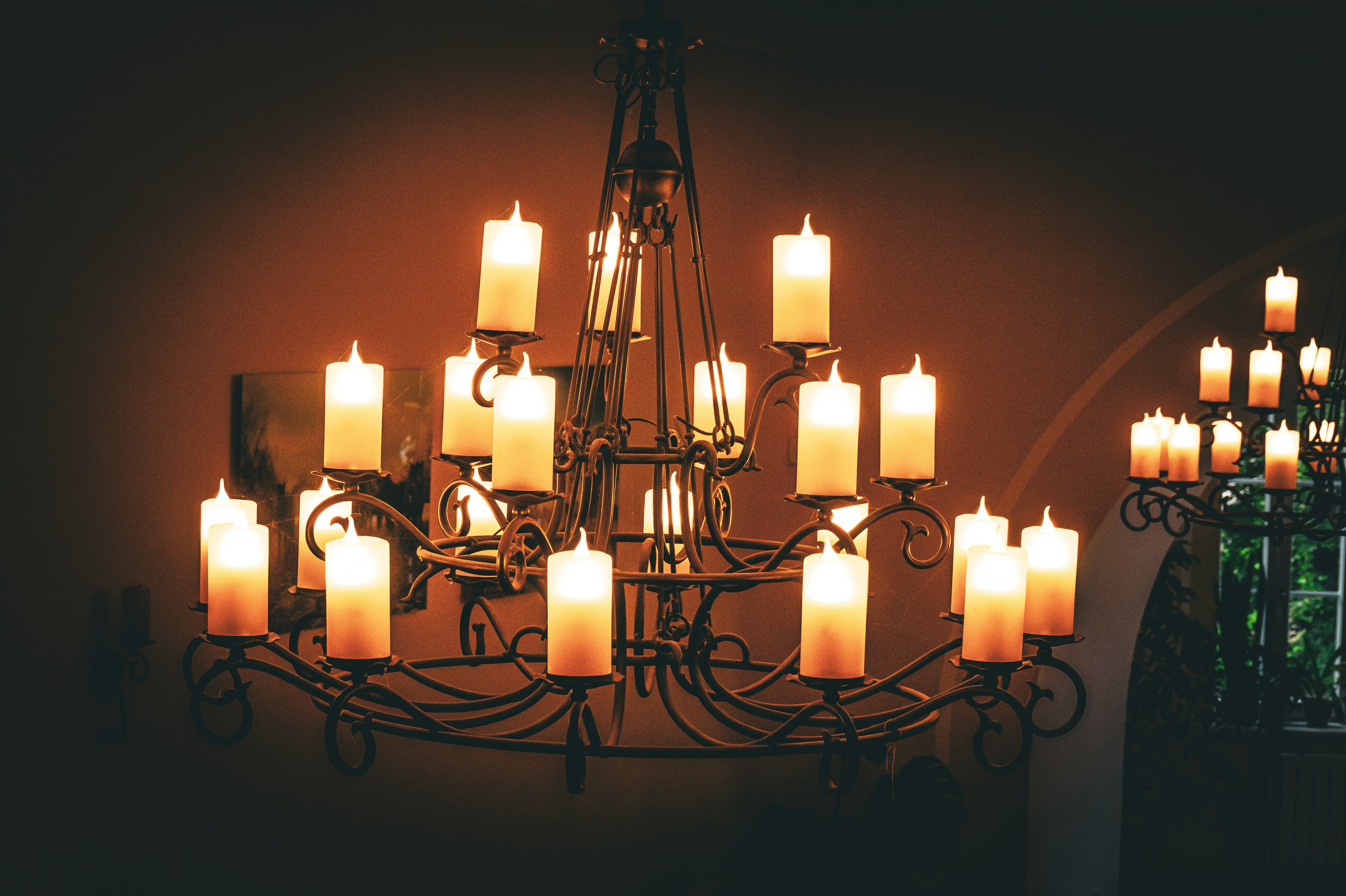 Candlelit Constellation: An Ornate Chandelier in Warm Ambient Glow