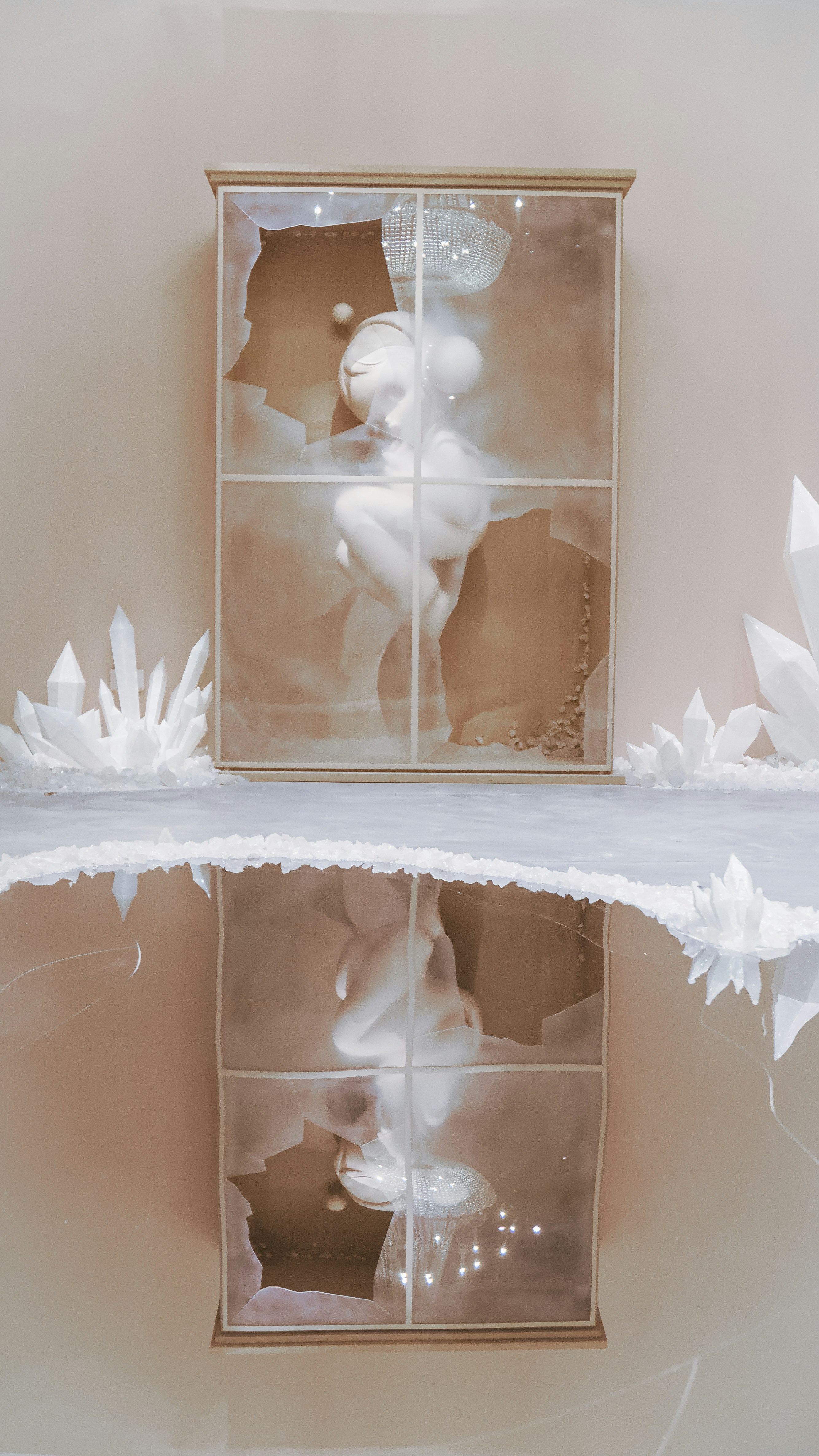 Framed Reflection: a Symmetrical Moment in Ice and Glass