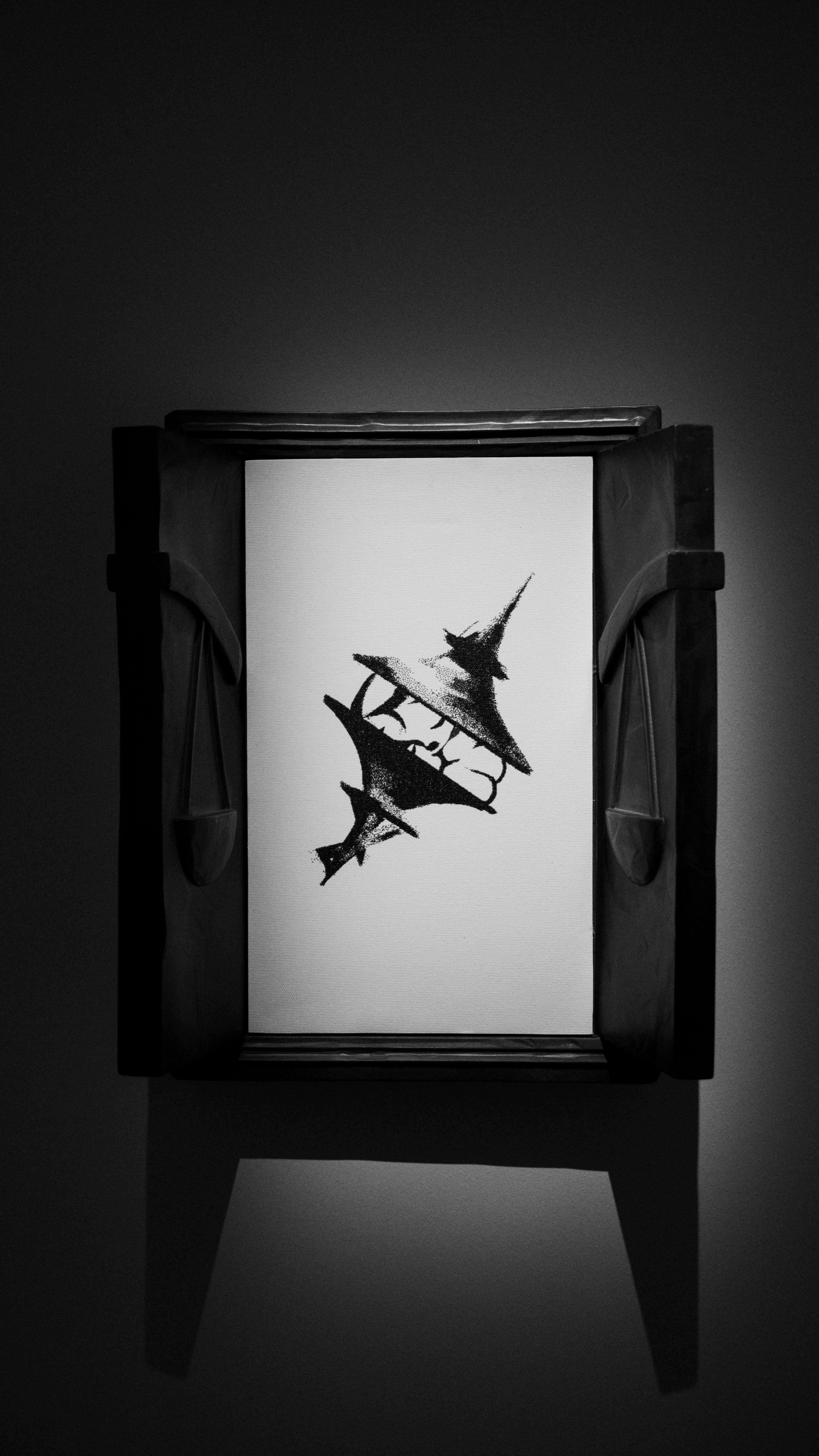 A Noir Projection: Jet Fighter Silhouette within a Studio Frame