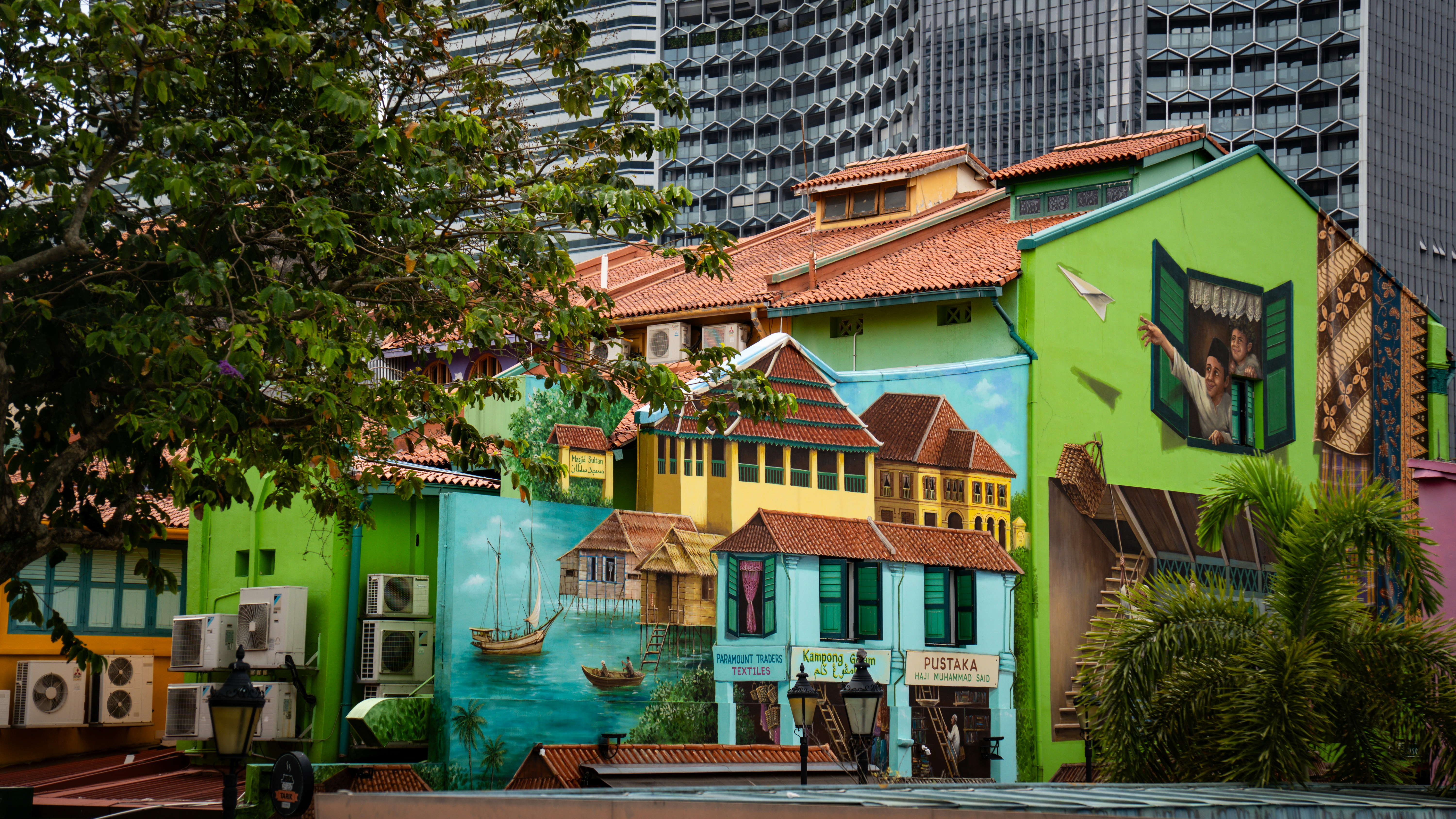 Colorful Waterfront Village Murals Come Alive on a City Building