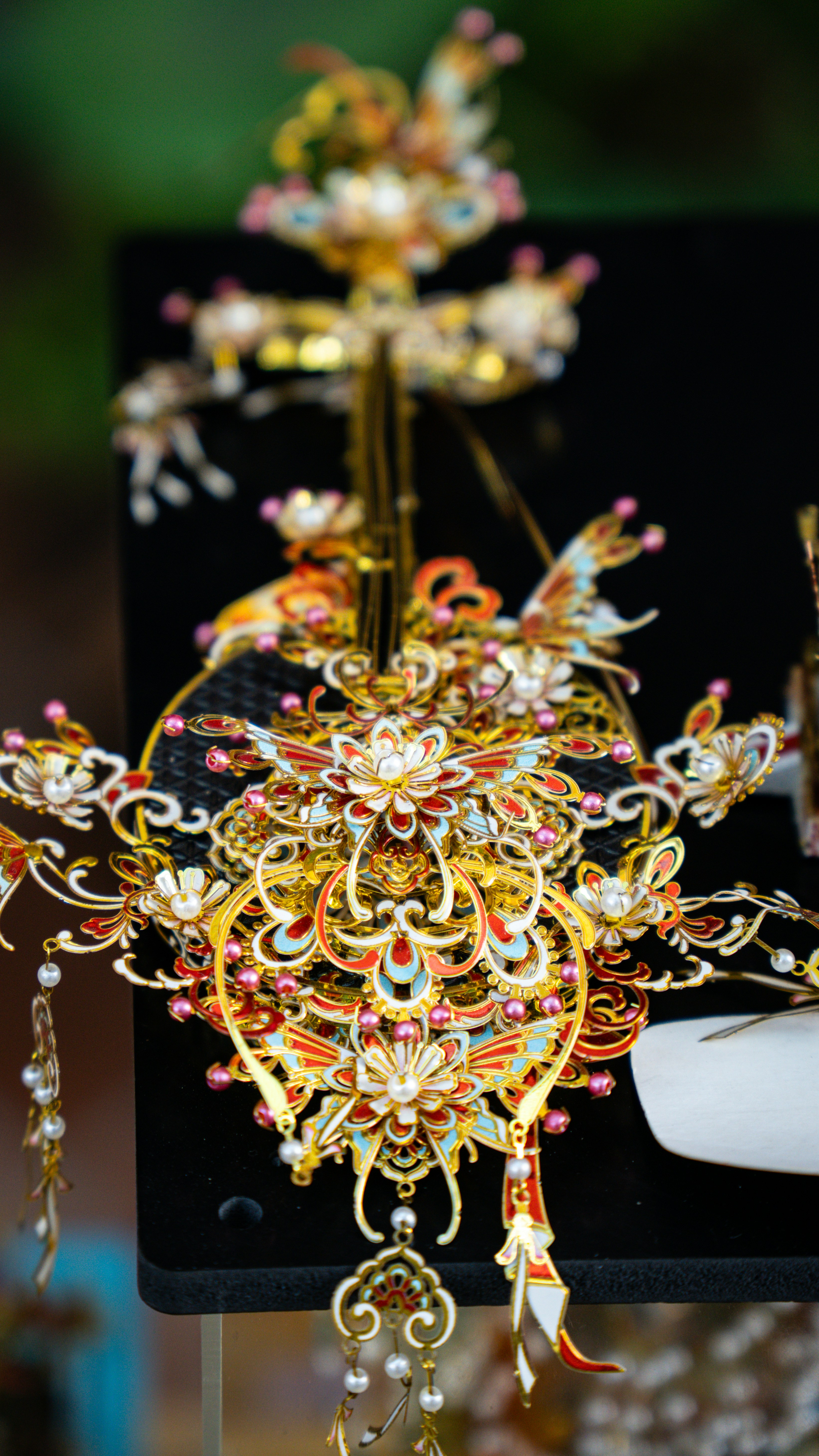 Ornate Lacing: Gemmed Adornment on a Dark Staged Backdrop