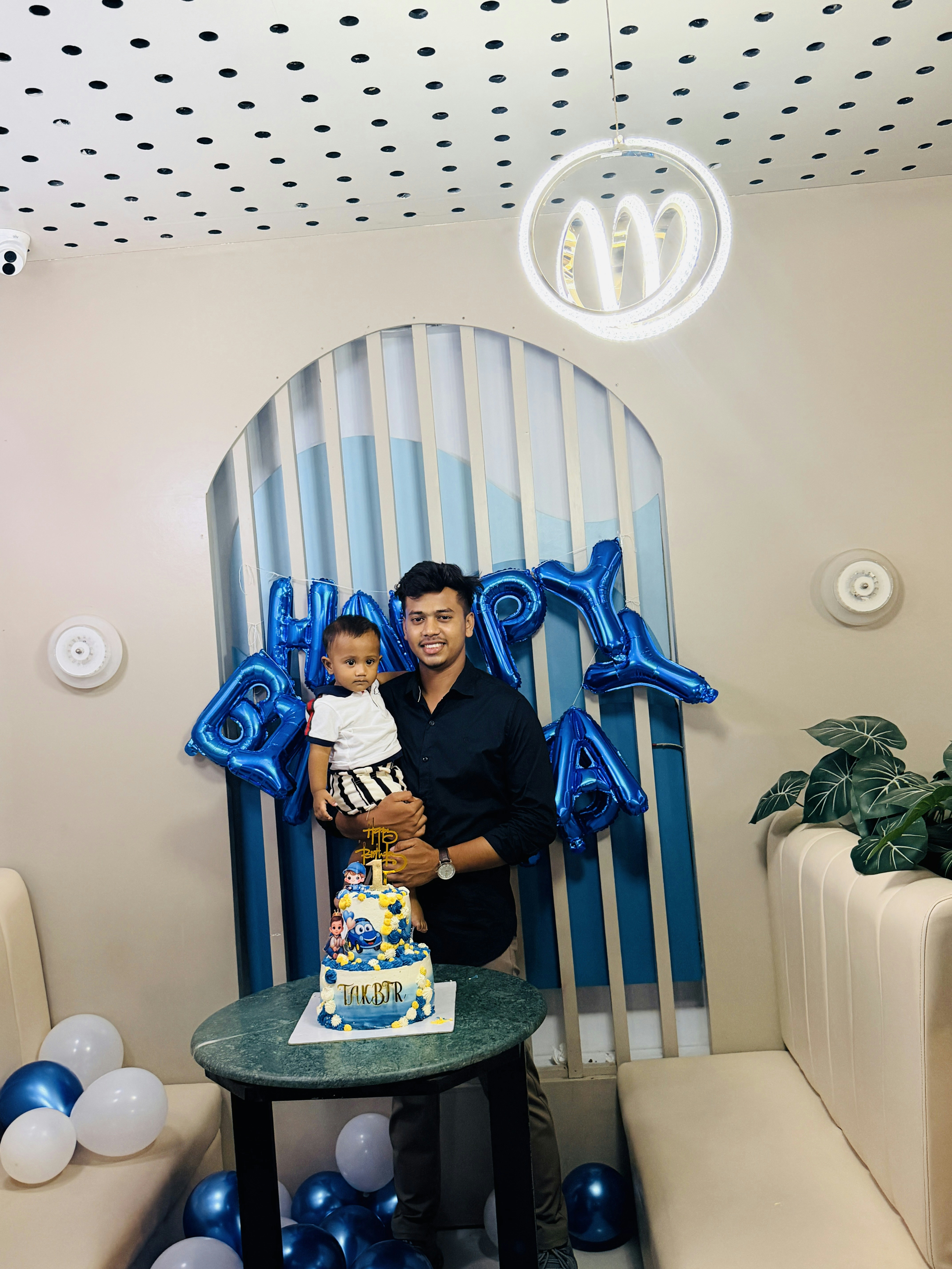 Birthday Moment Under Blue Balloon Letters