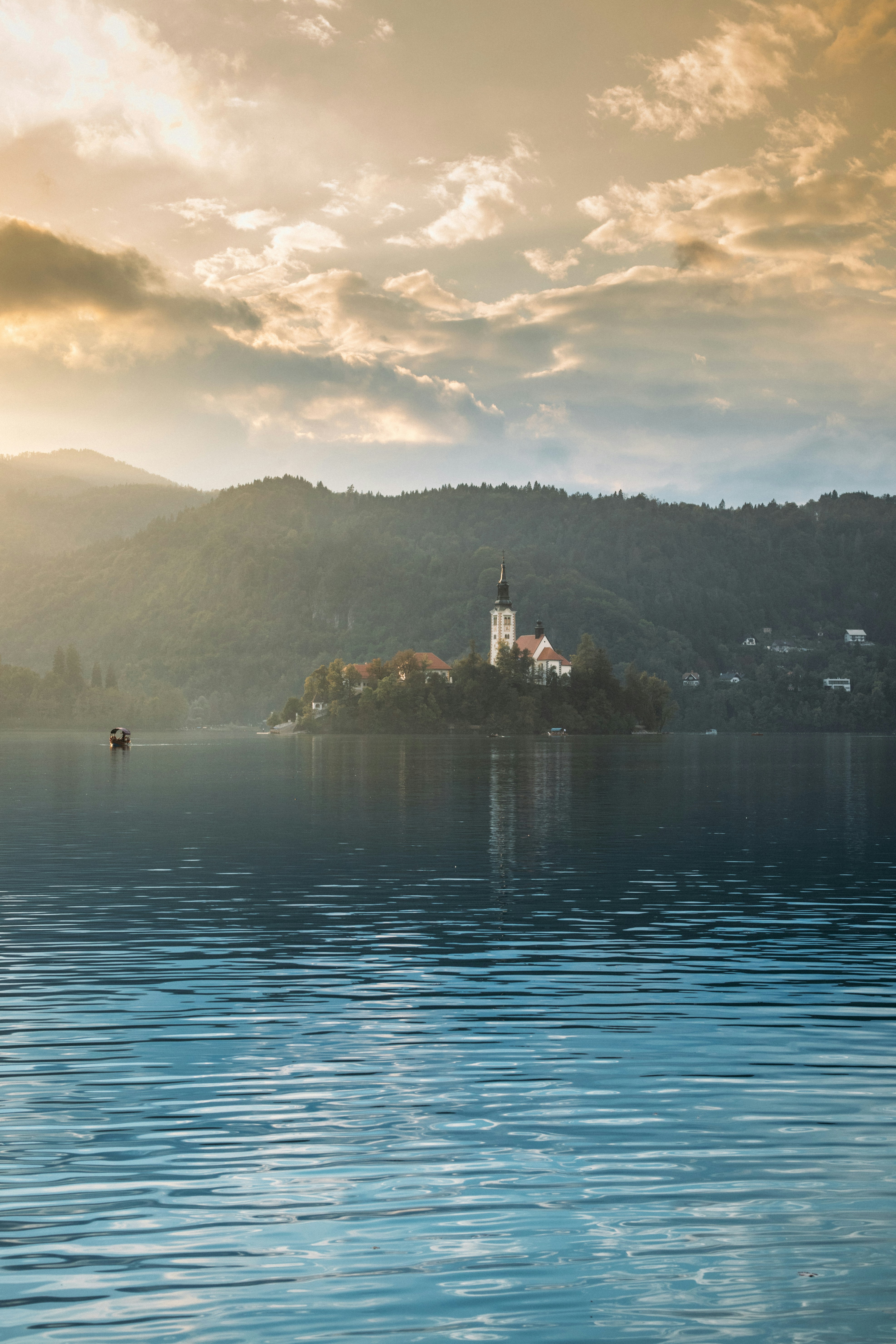 Island Church in Misty Lake at Sunset
