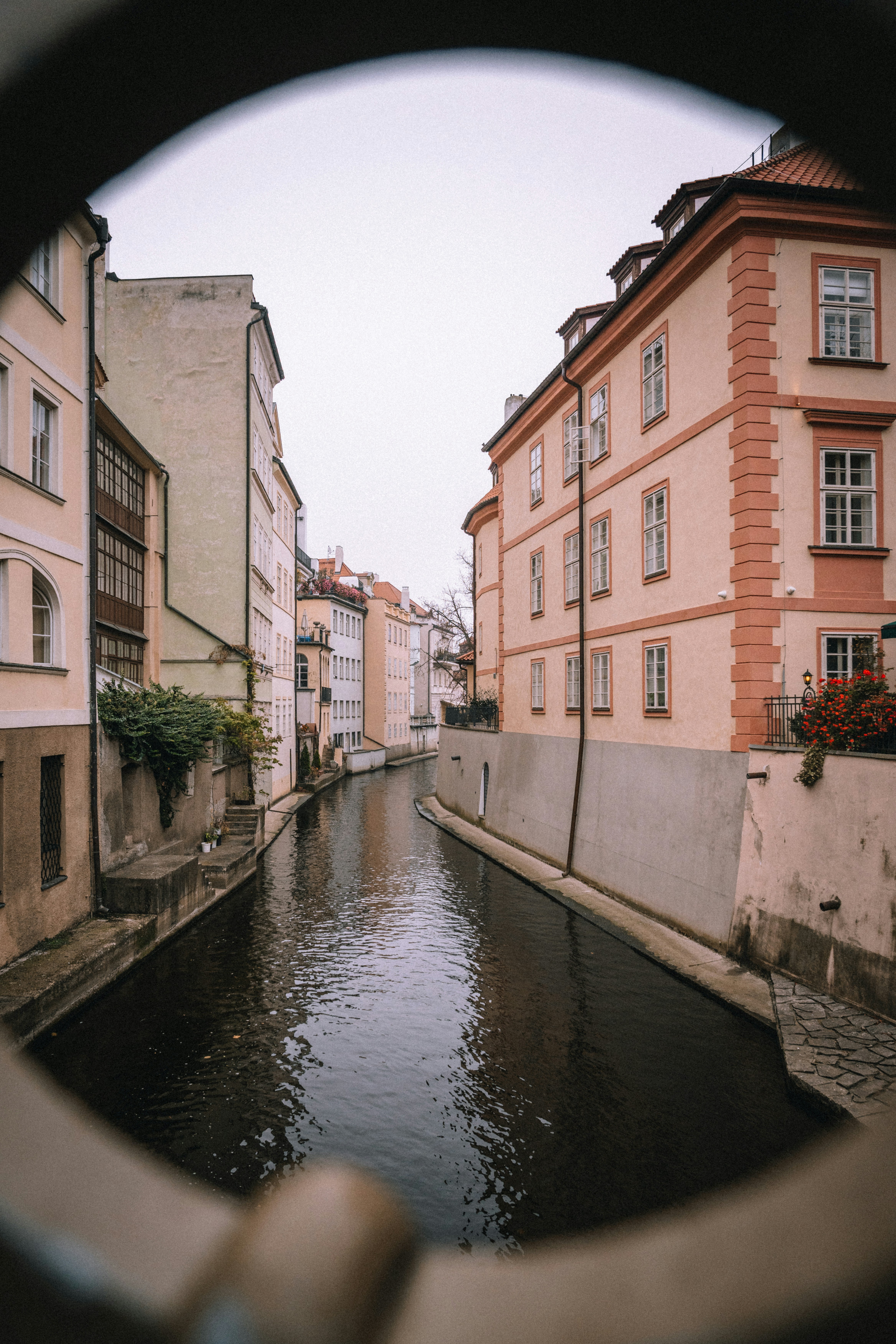 Bridged Canal Portrait through a Circular Frame