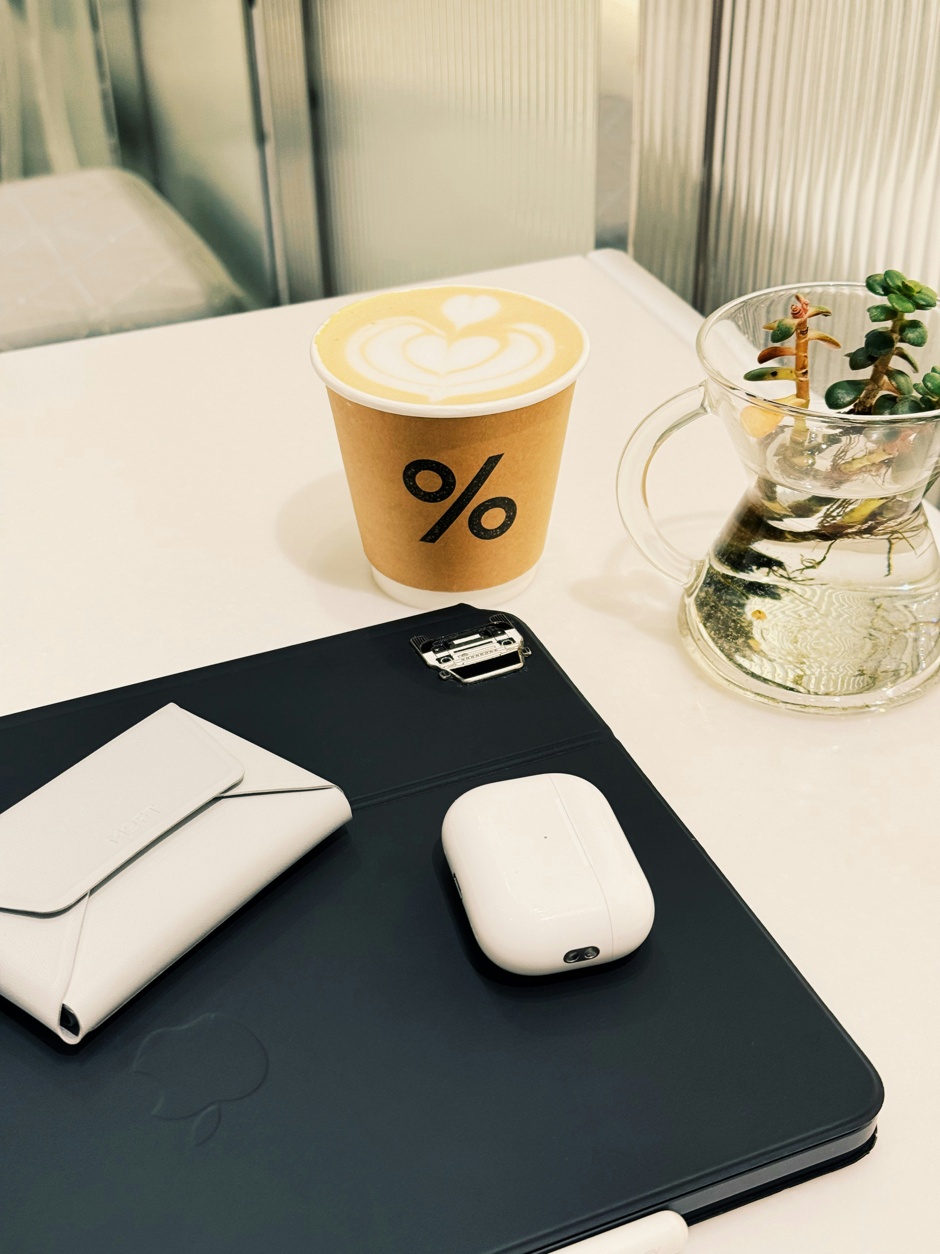 Minimal Tech Workspace with a Latte Capsule