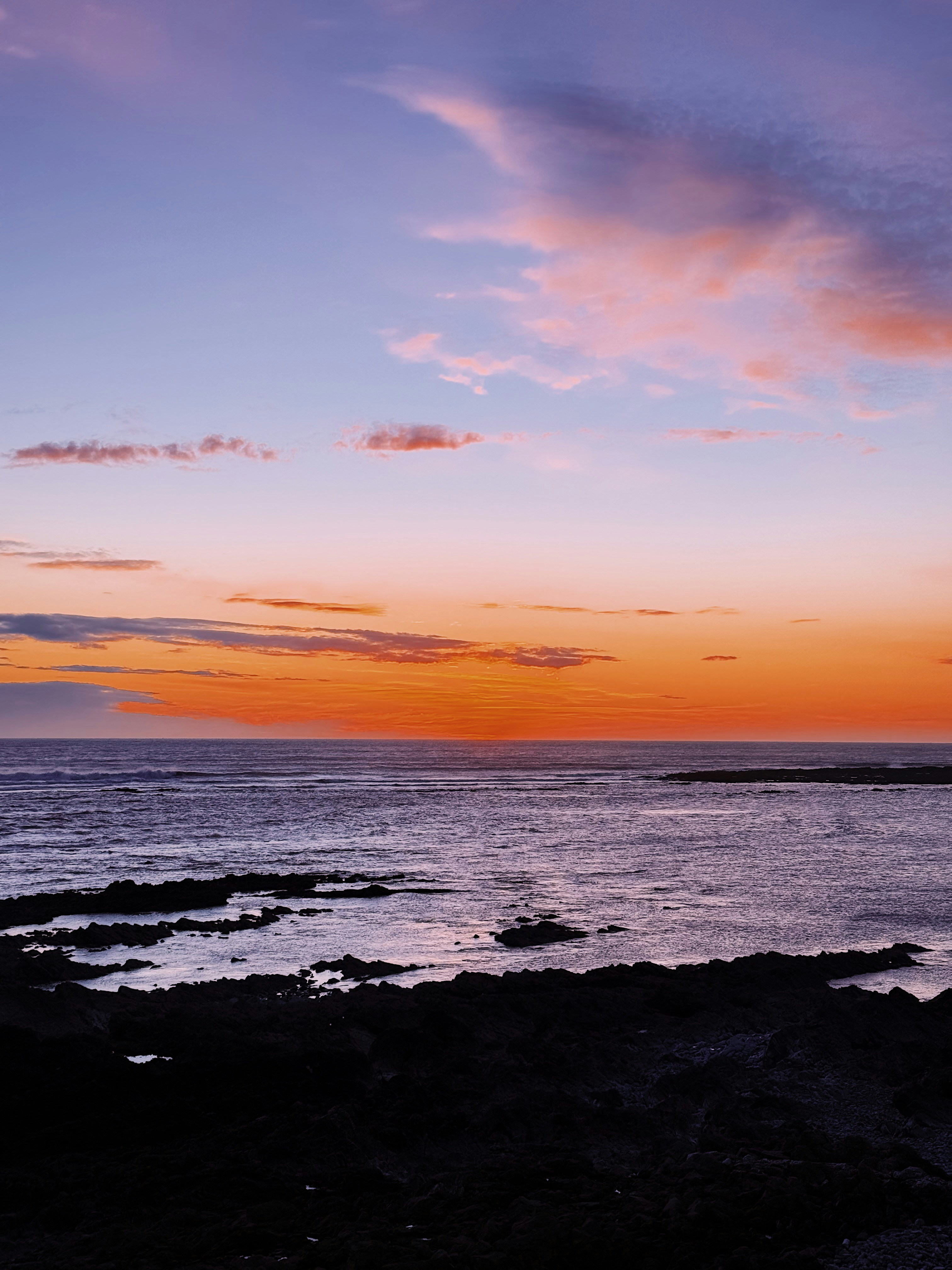 Horizon Fire: Dusk Over Ocean Veil
