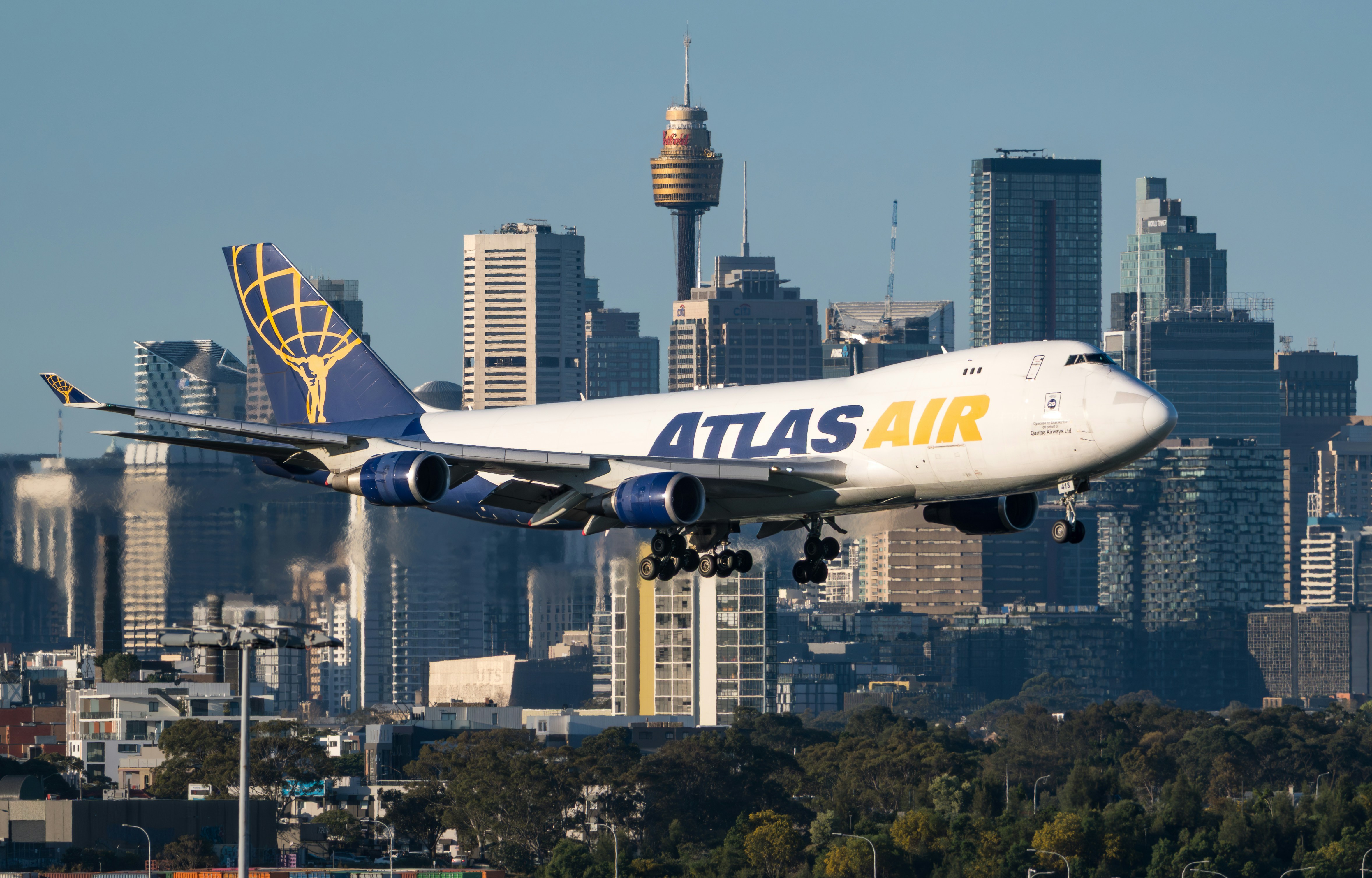 Atlas Air 747 Approaching City Approach Over Waterfront Skyline