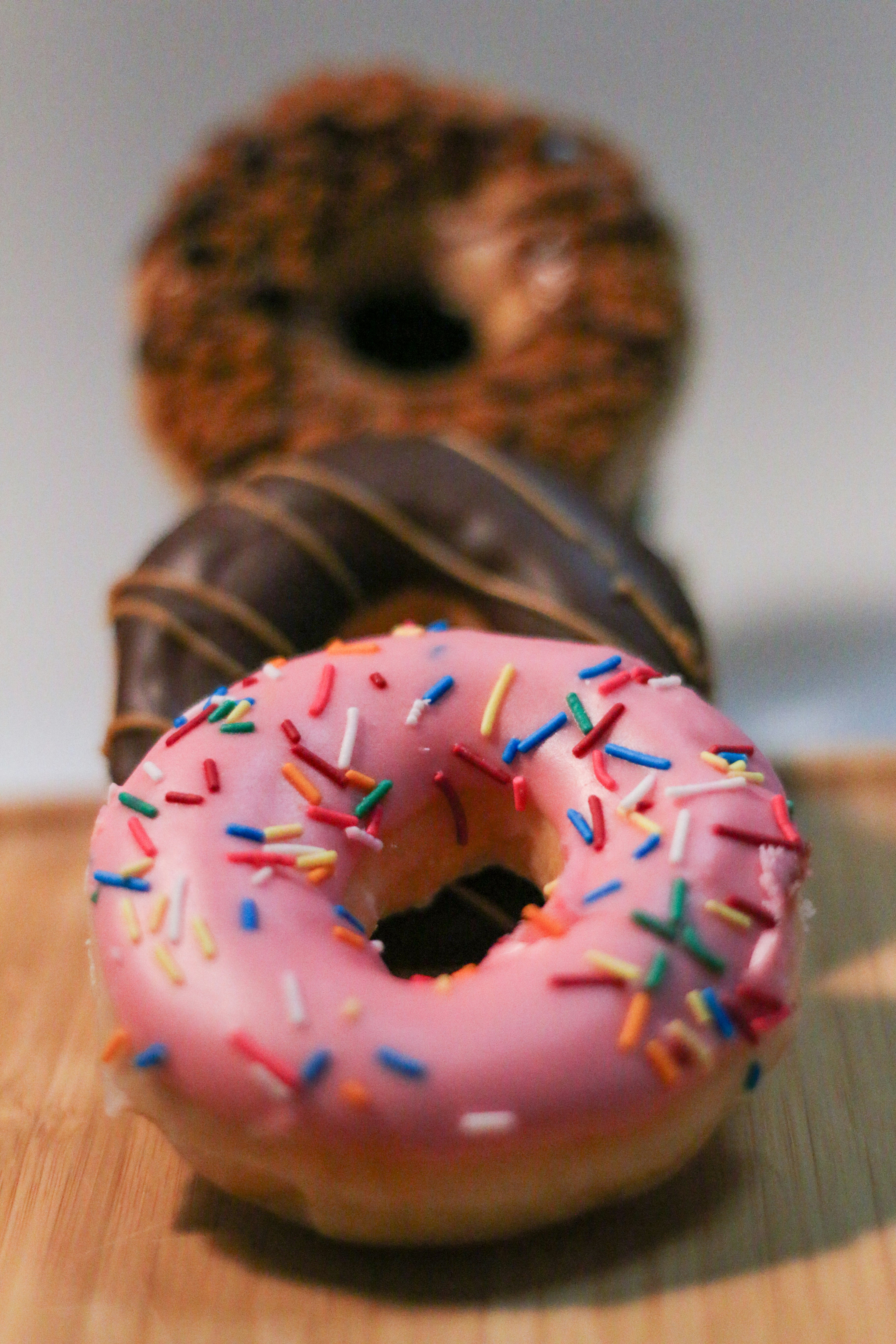 Candy Sprinkles in Focus: A Donut Tale with Chocolate Drift