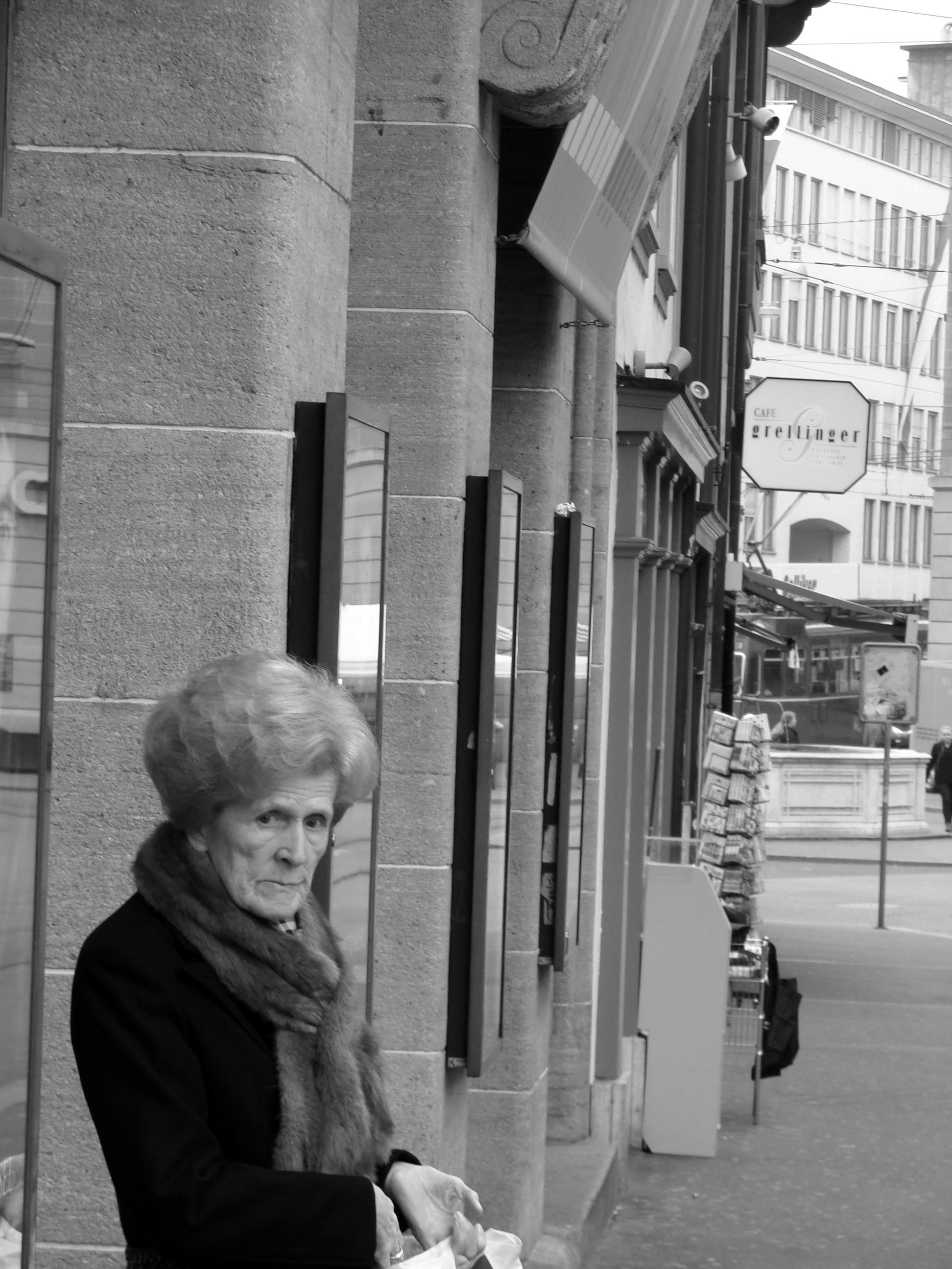 Elderly Portrait in a Quiet Street Corridor
