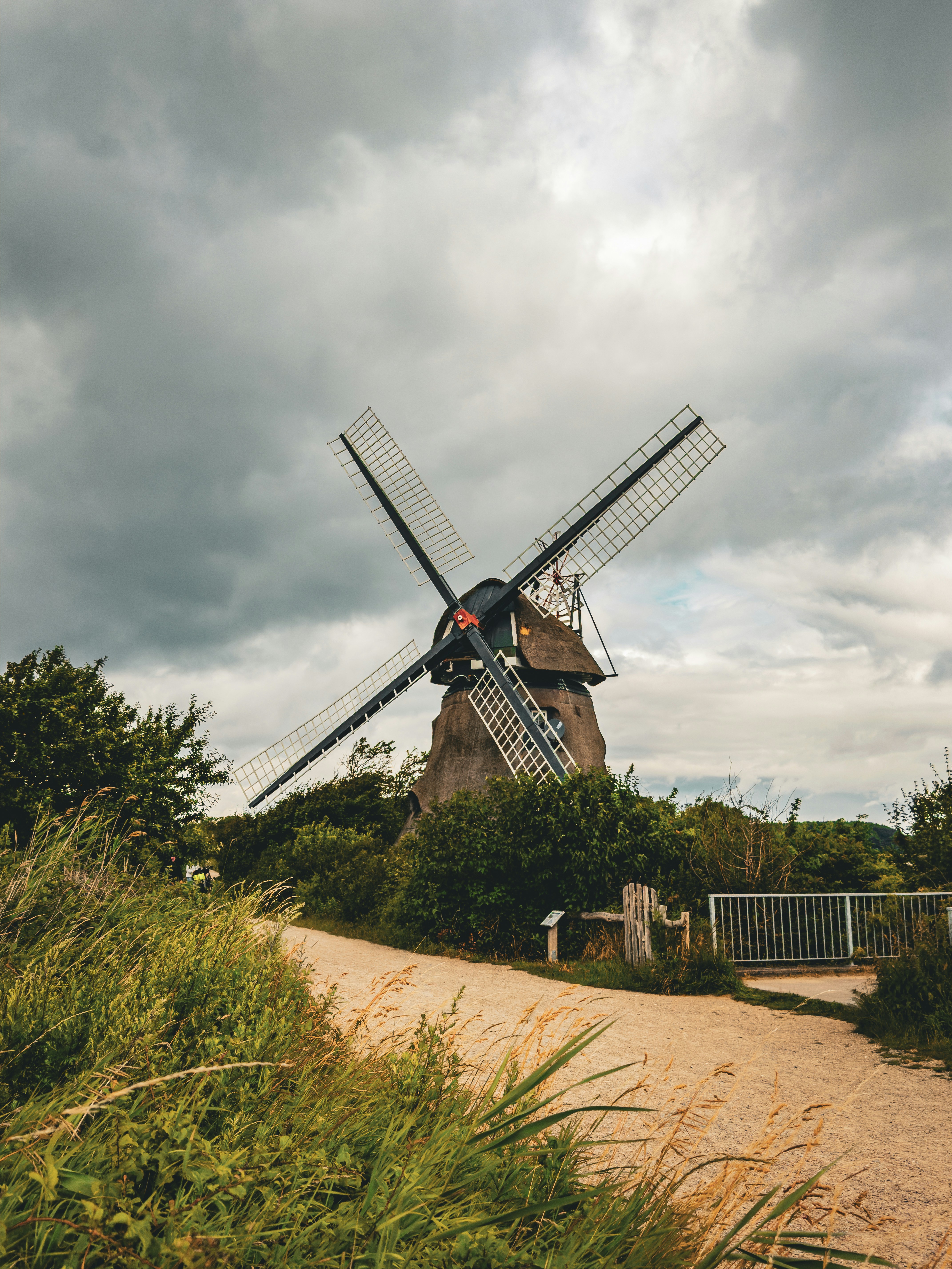 Giant Windmill in a Gravel Pathcape