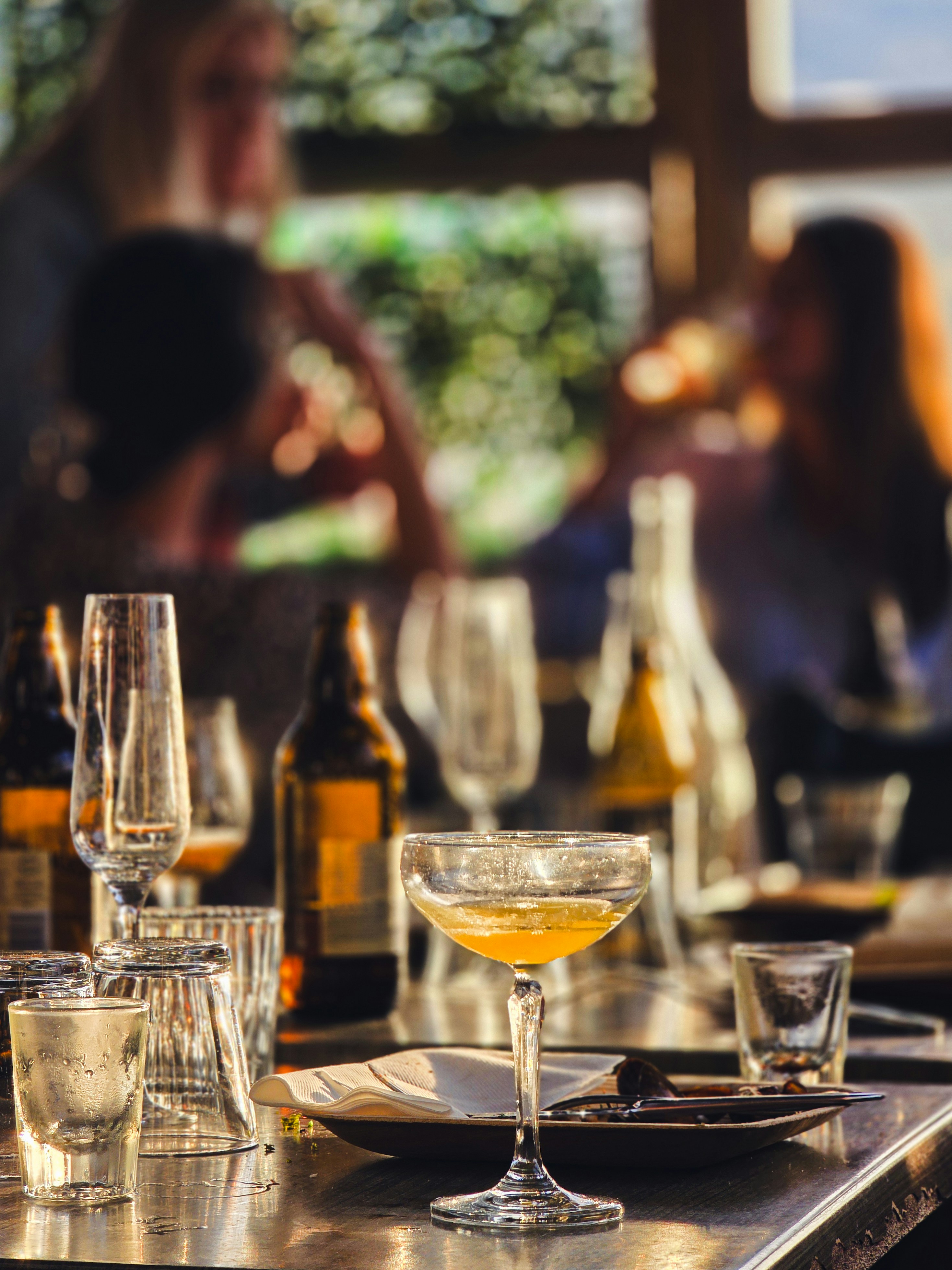 Sunlit Bar Glory: A Glass-Fronttable Moment