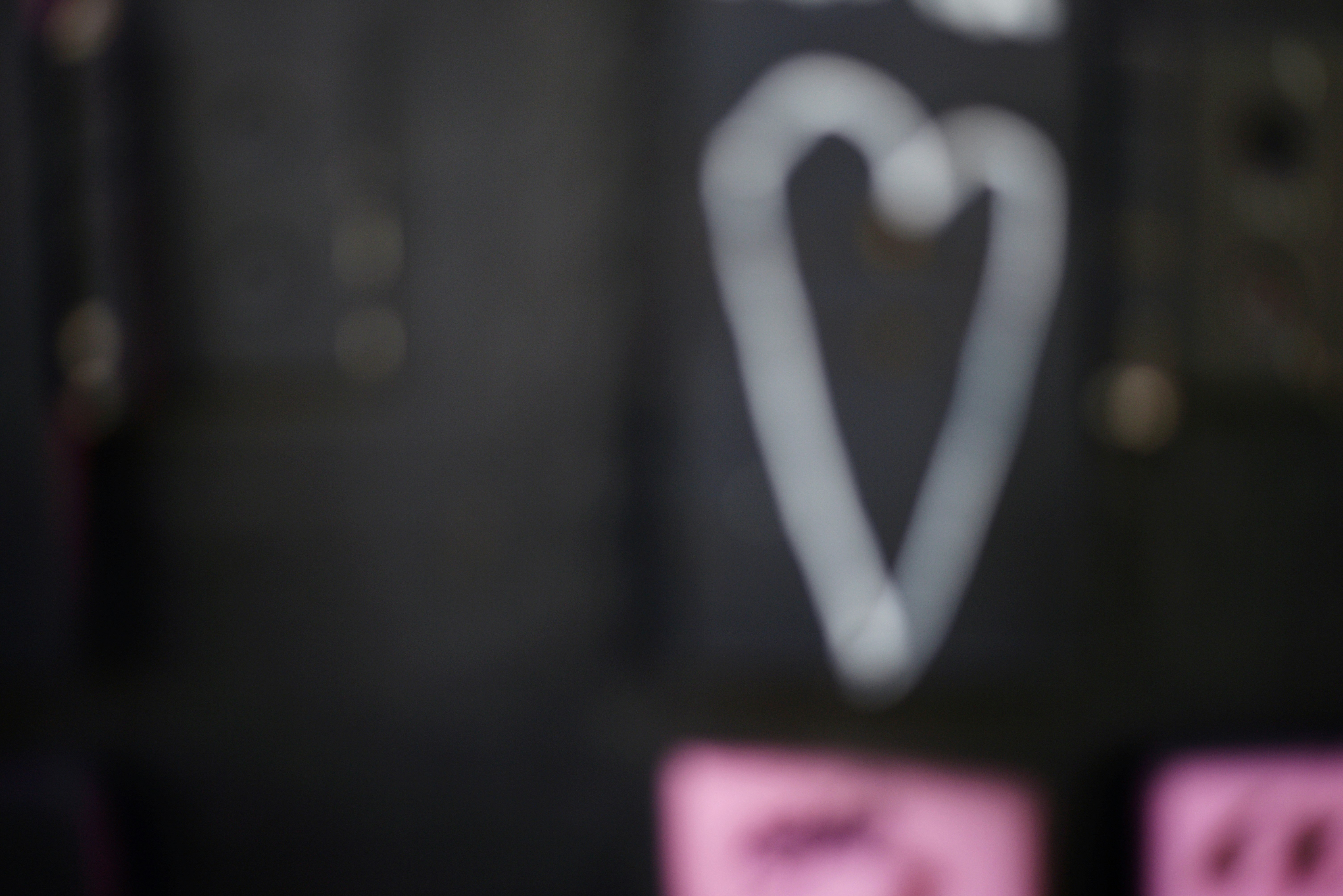 Blurred Graffiti Heart on a Dark Doorway
