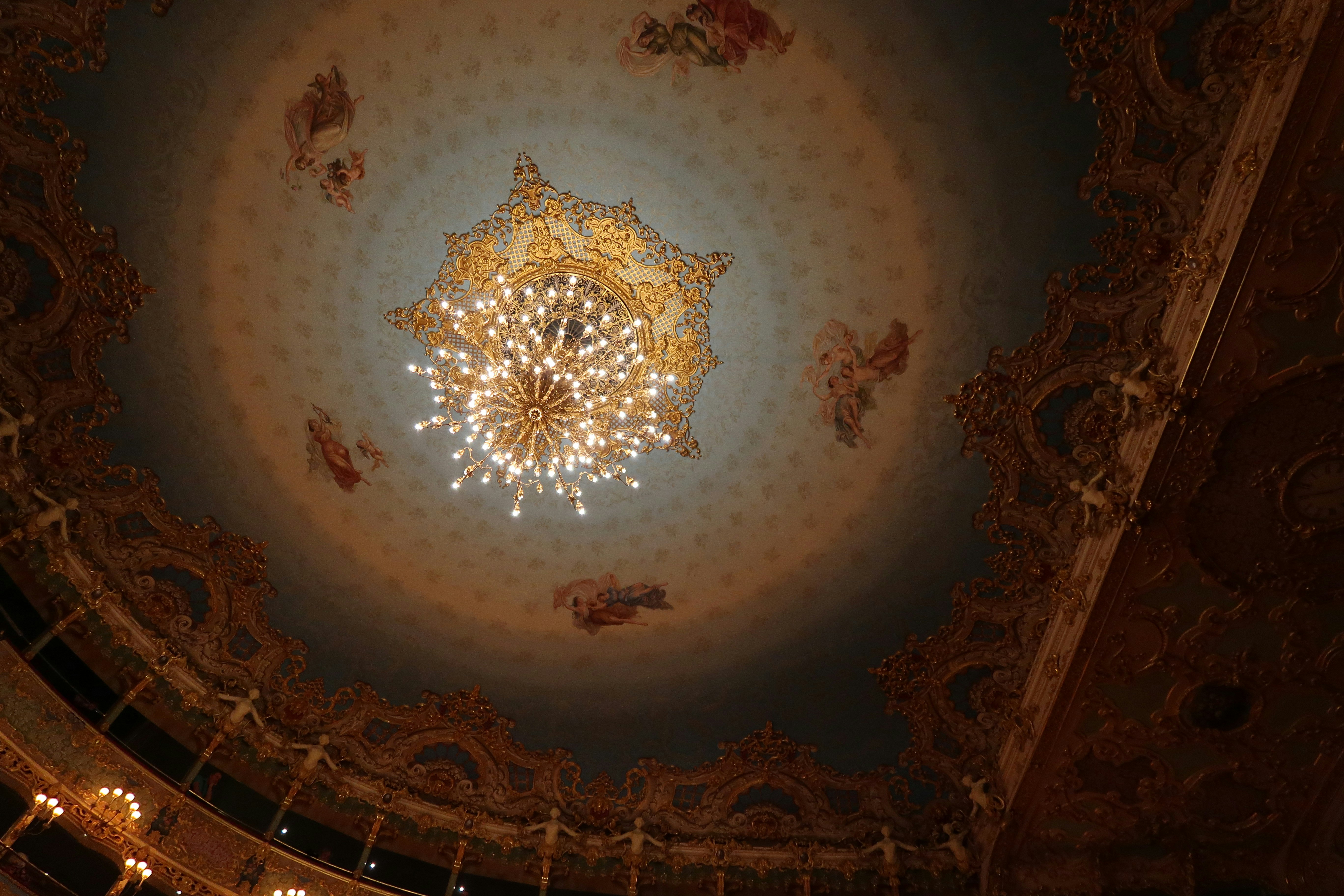 Ornate chandelier Crown: A Golden Ceiling Radiance
