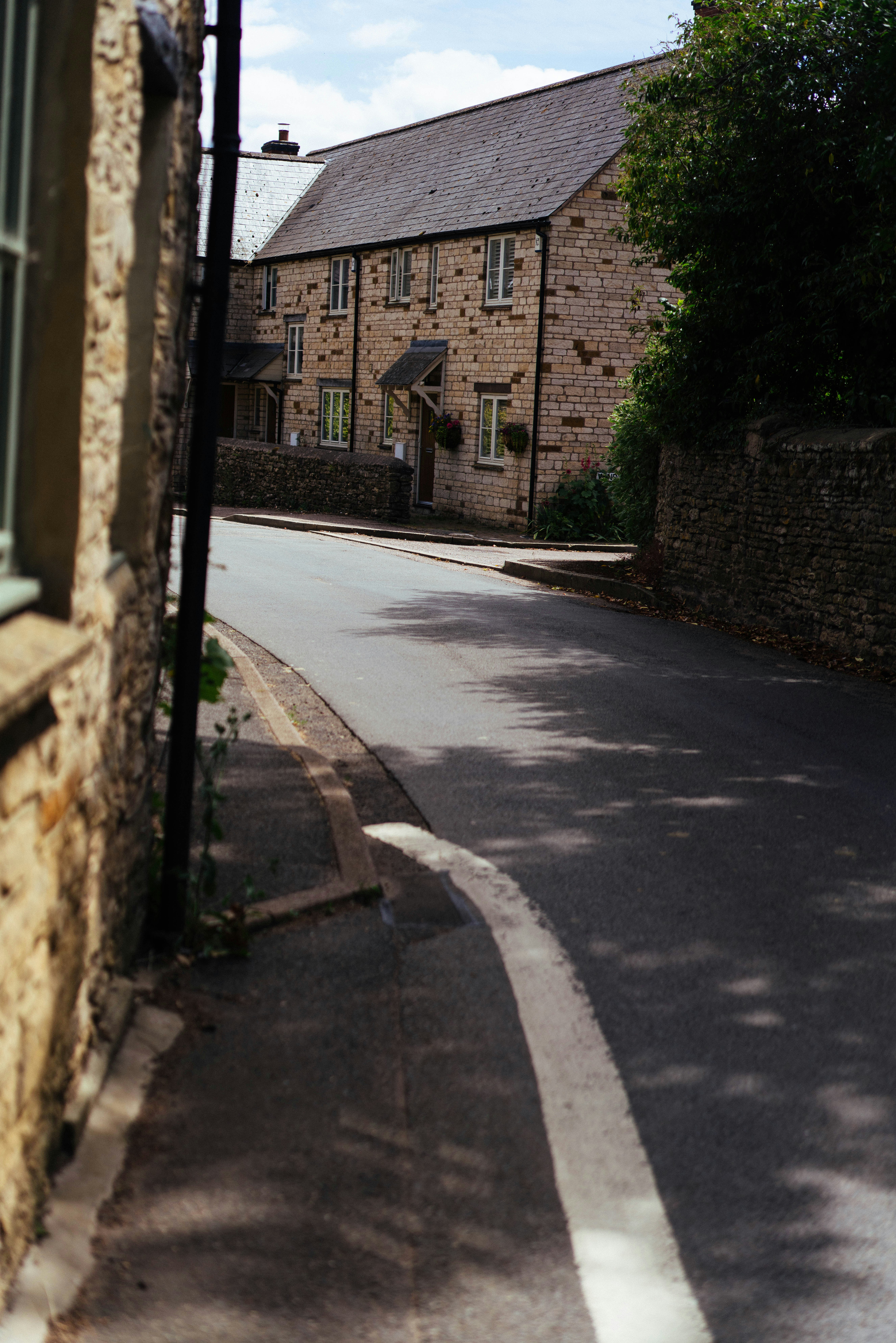 Curved Lane Through a Quiet Stone Village
