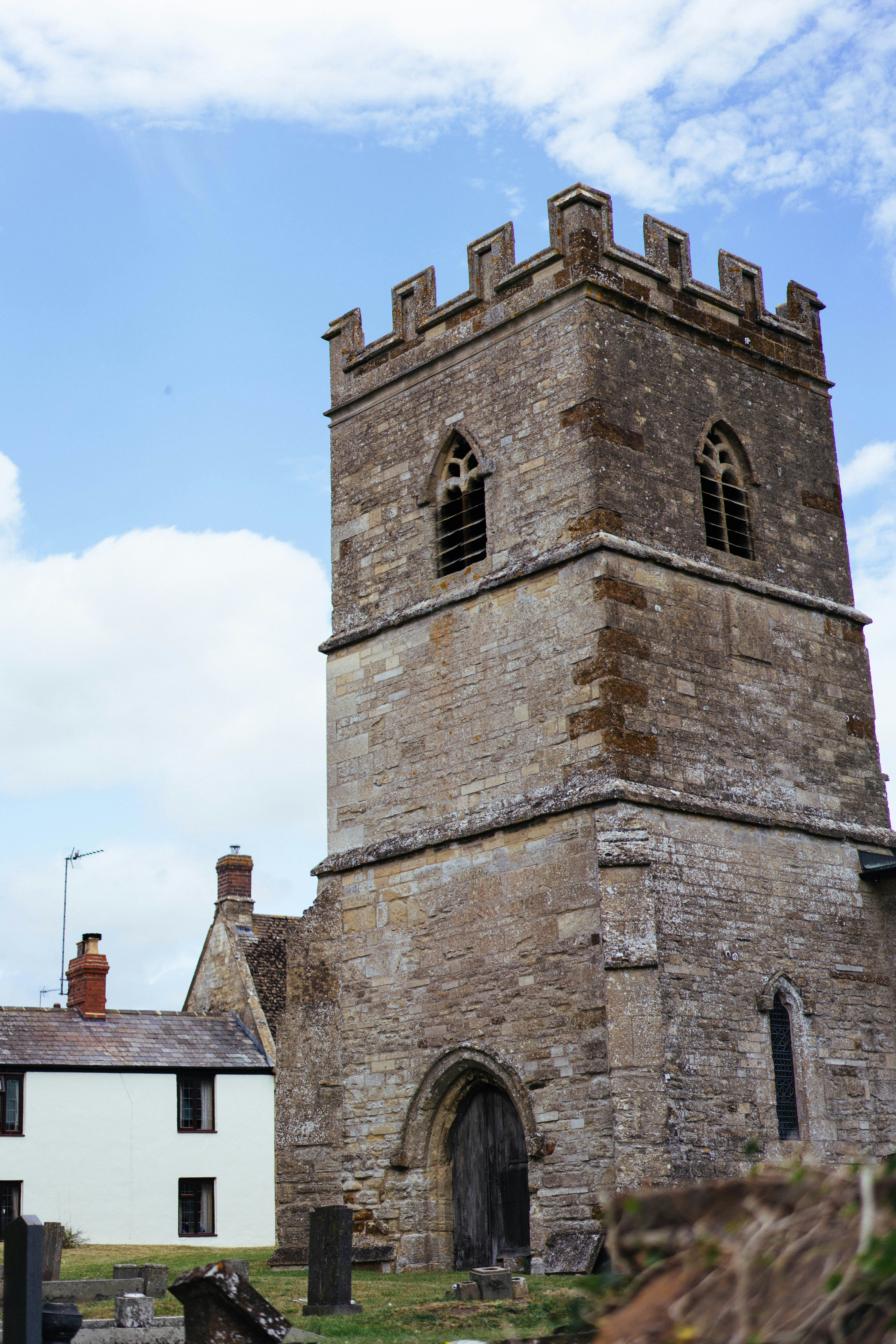 Stone Sentinel: A Medieval Tower Crowned with Battlements