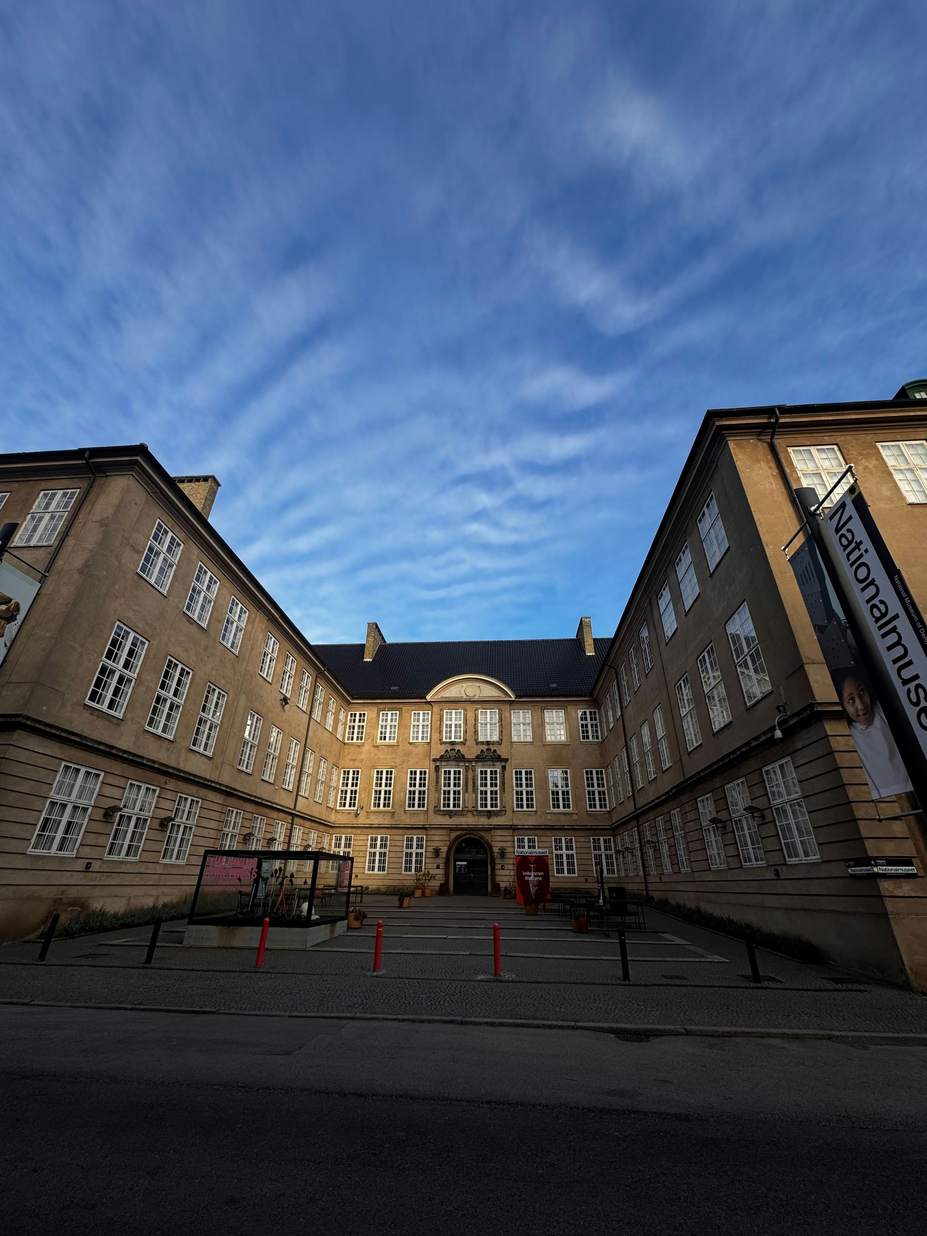 Courtyard Facades Under a Wide Sky