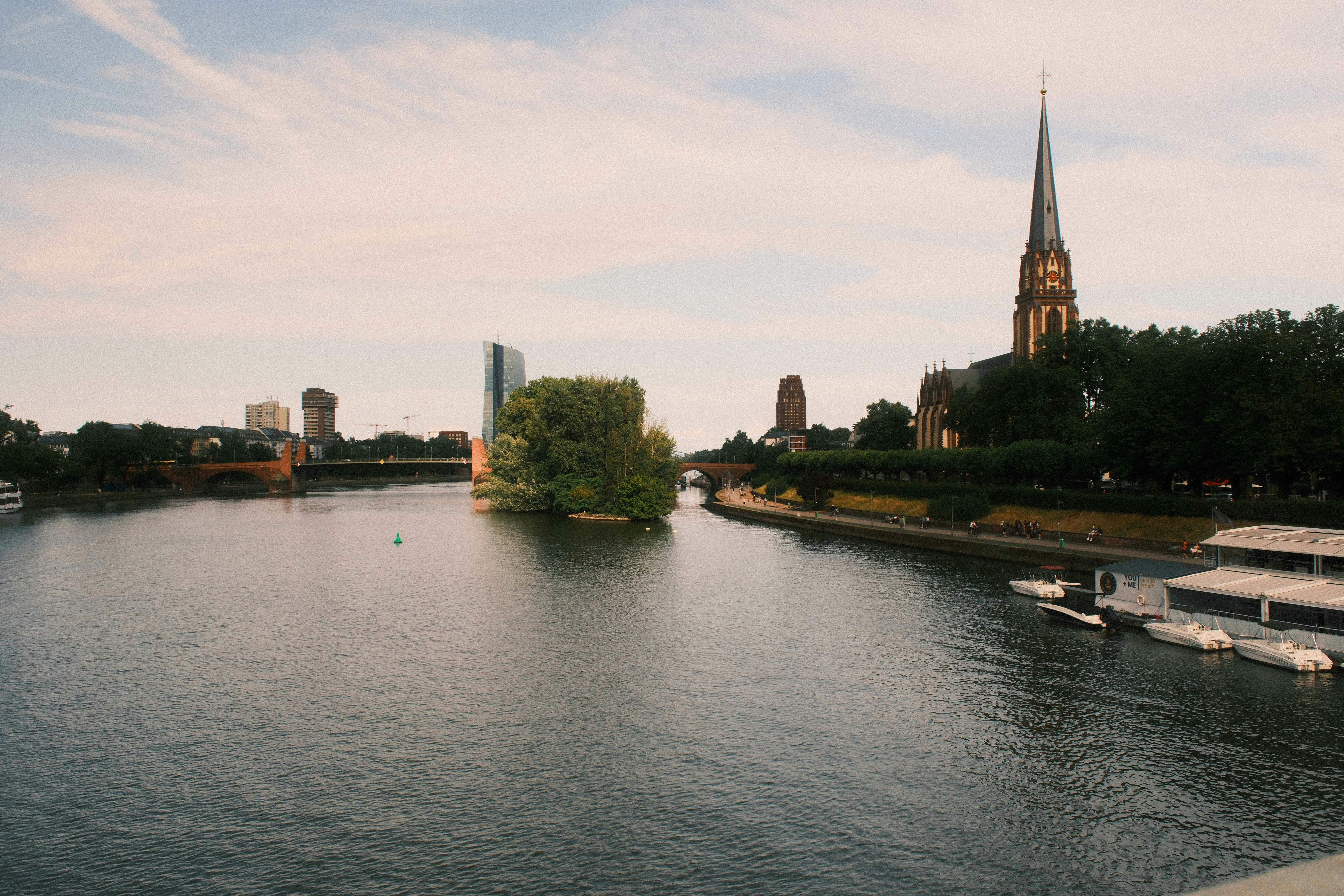 City Hall by the River: A Calm Skyline with a Spire