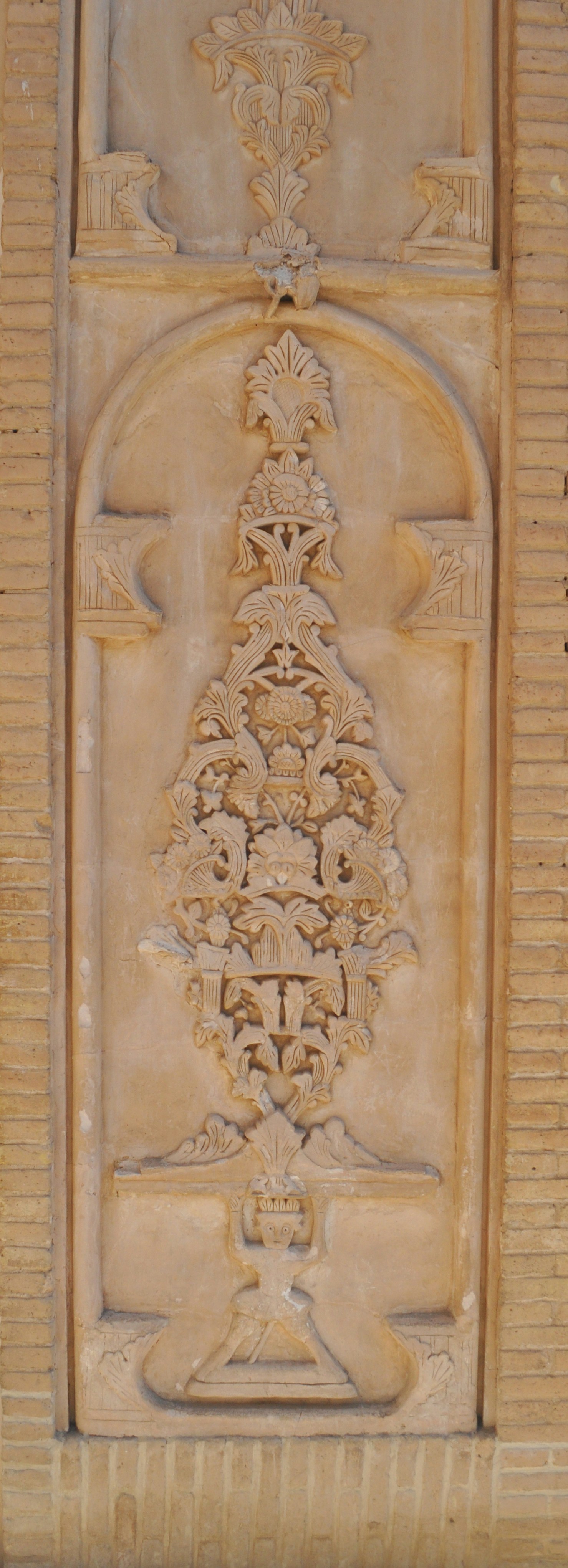 Ornate Carved Facade Tapestry: Stonework in Soft Sandstone