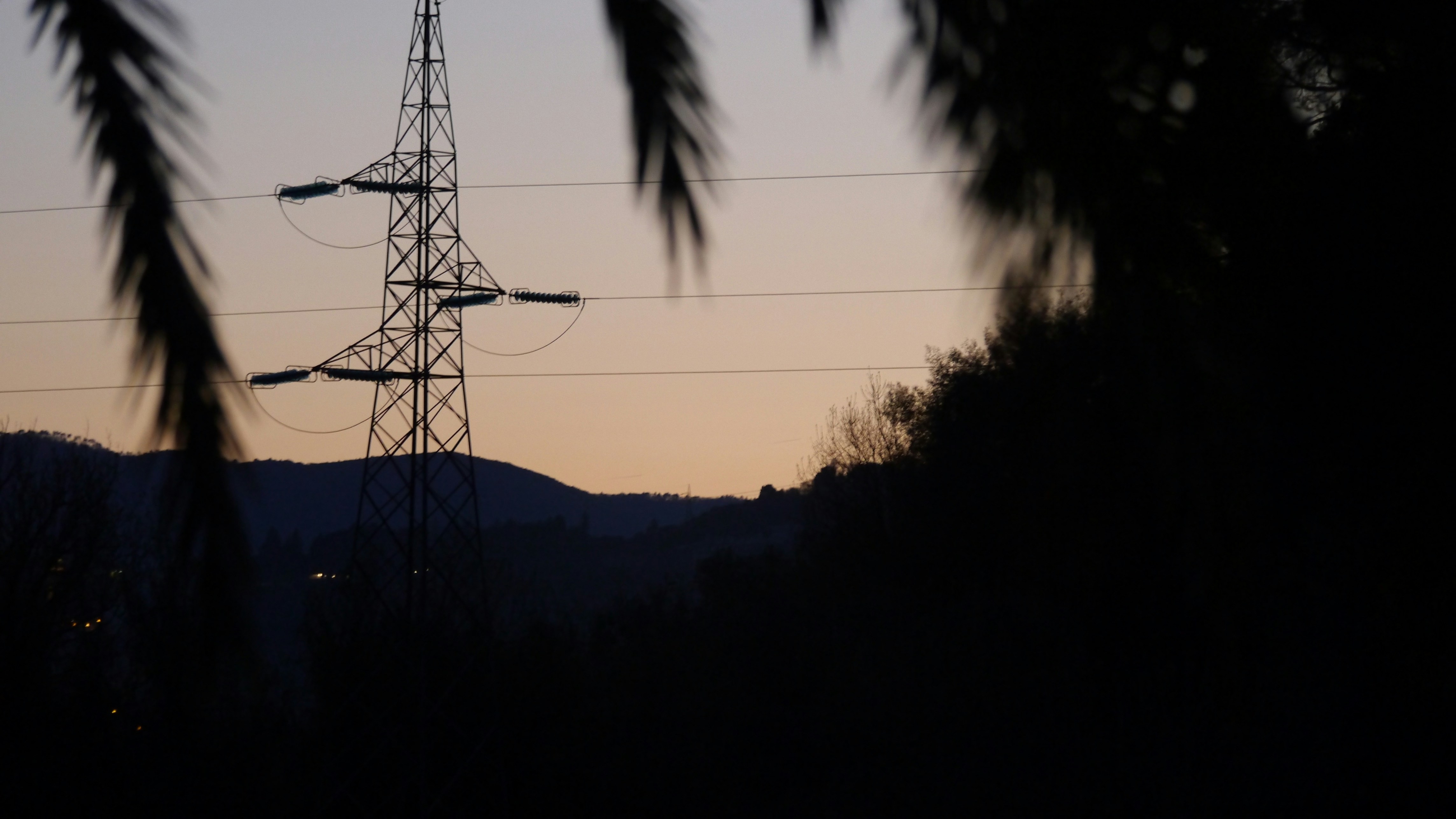 Silhouette Skyline: Power Lines at Dusk