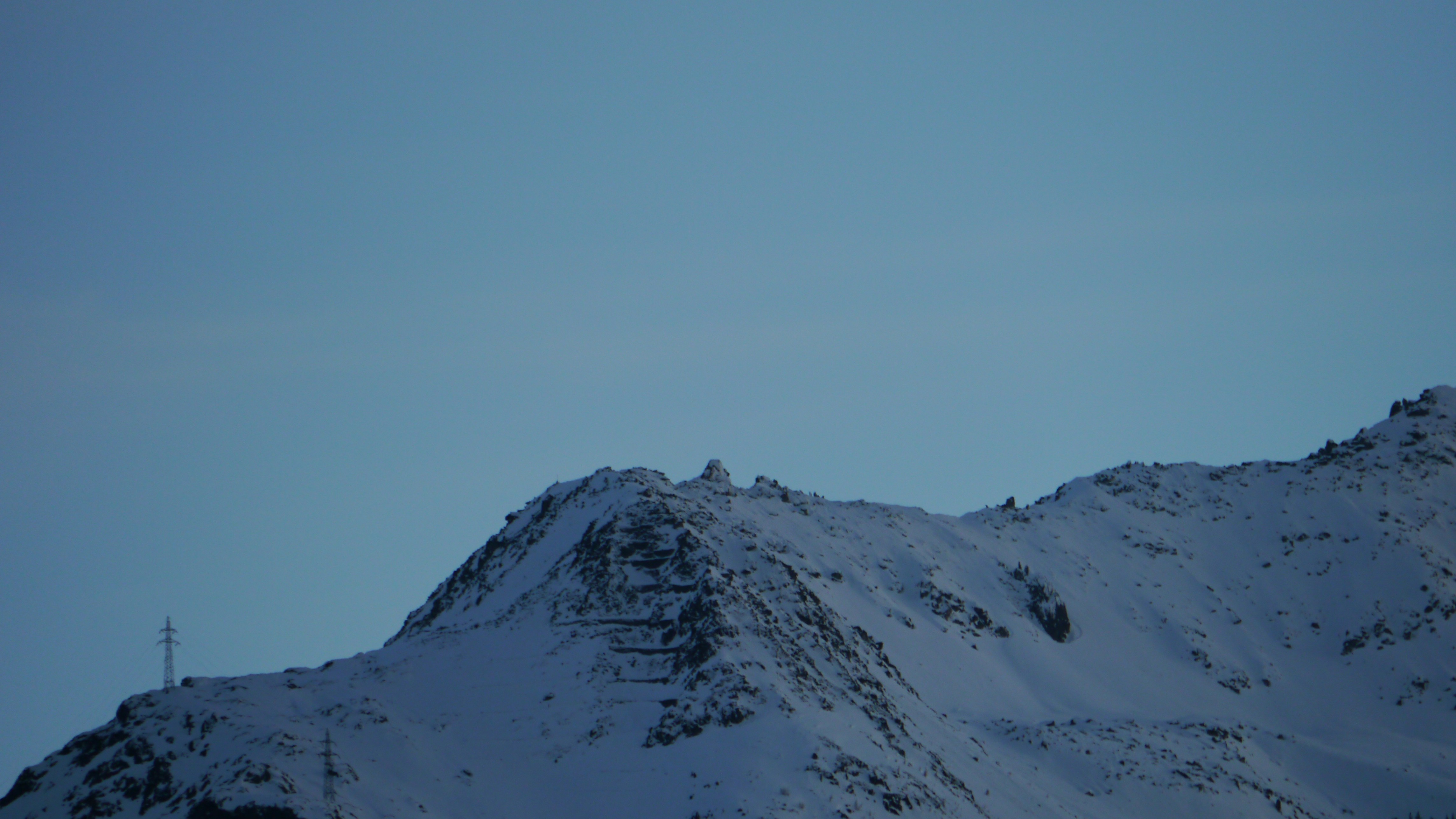 Snowbound Peak under a Quiet Blue Sky