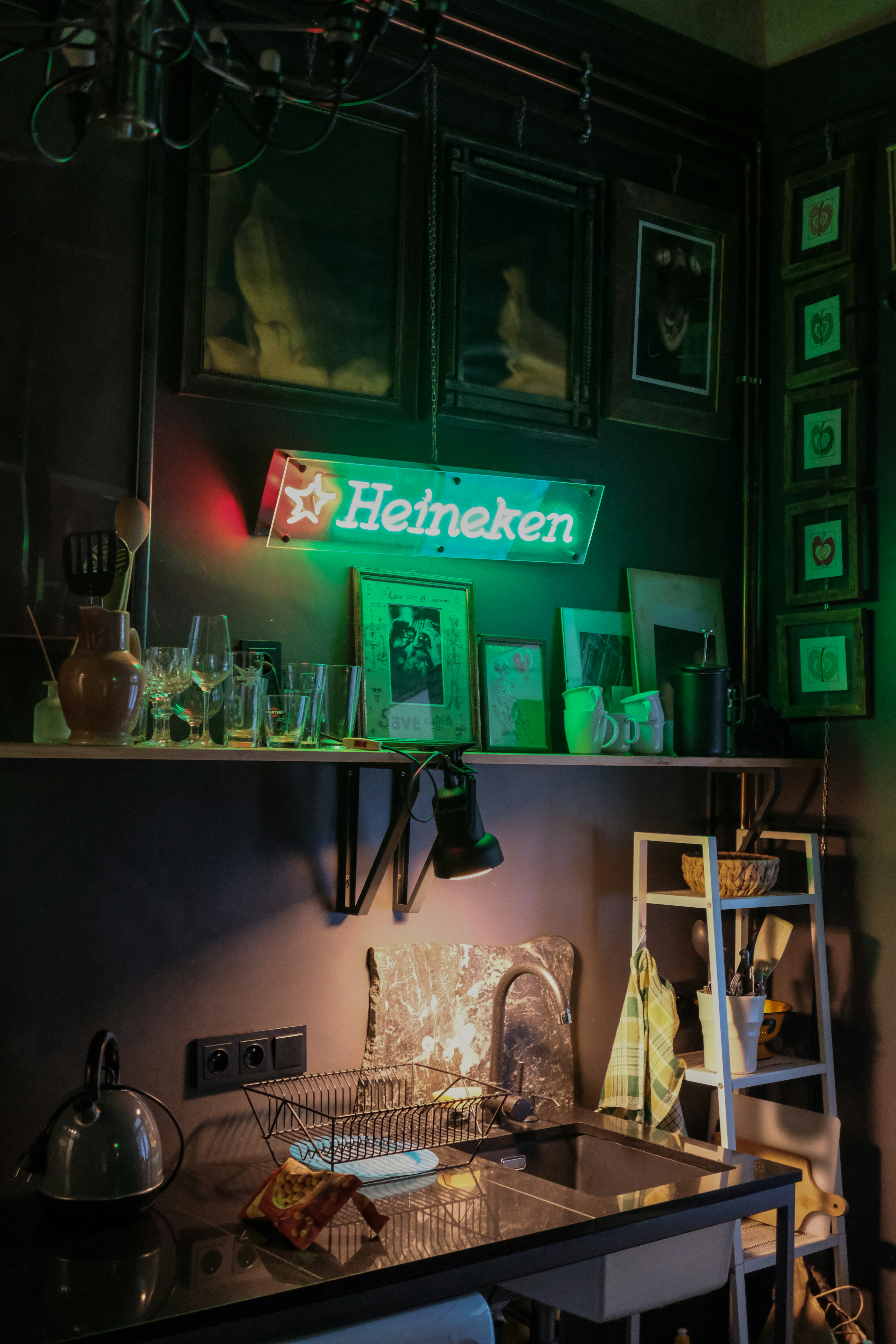 Neon Heineken Glow Above a Humble Kitchen Bar