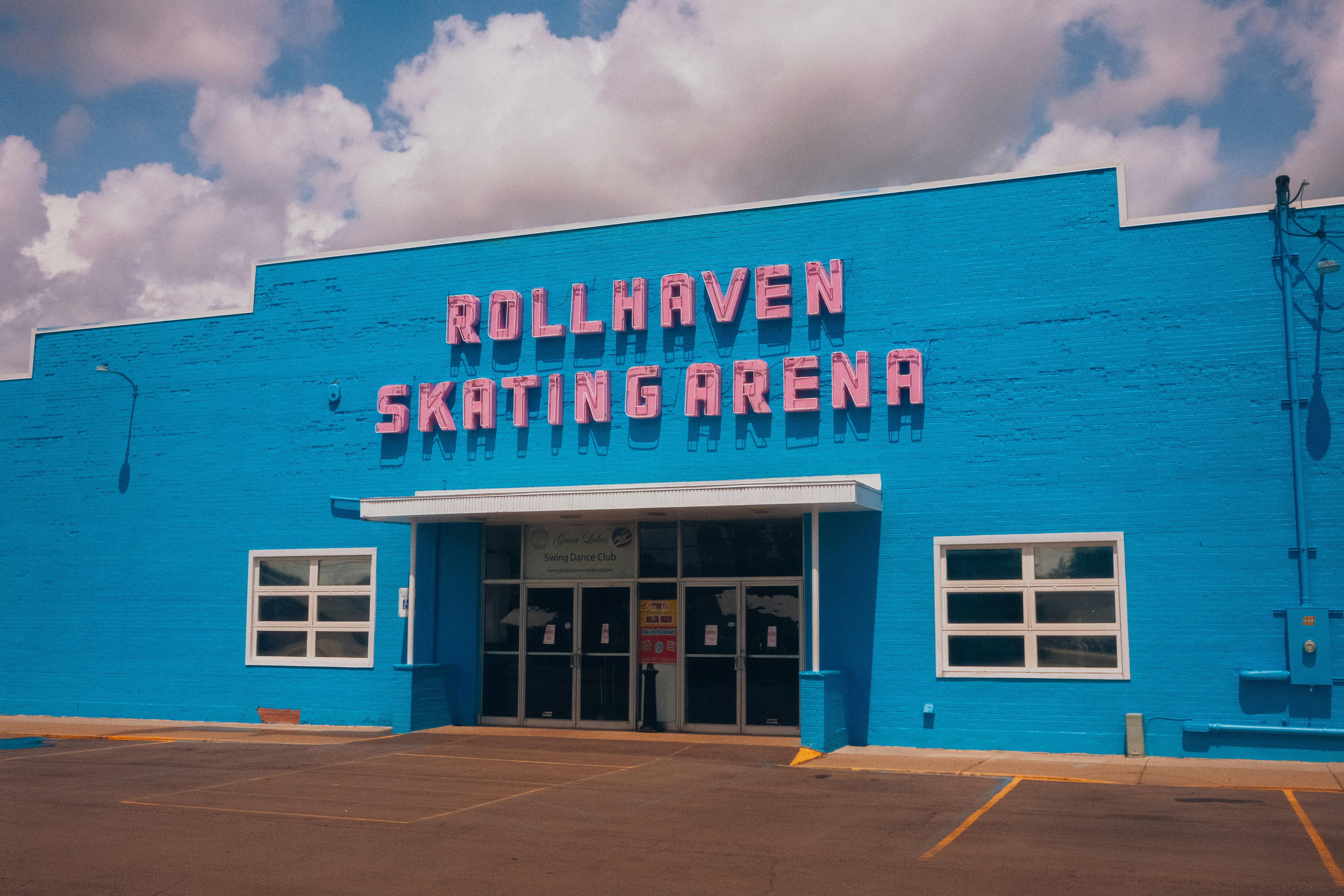 Rollhaven Blue: An Arcade of Asphalt and Neon Signage