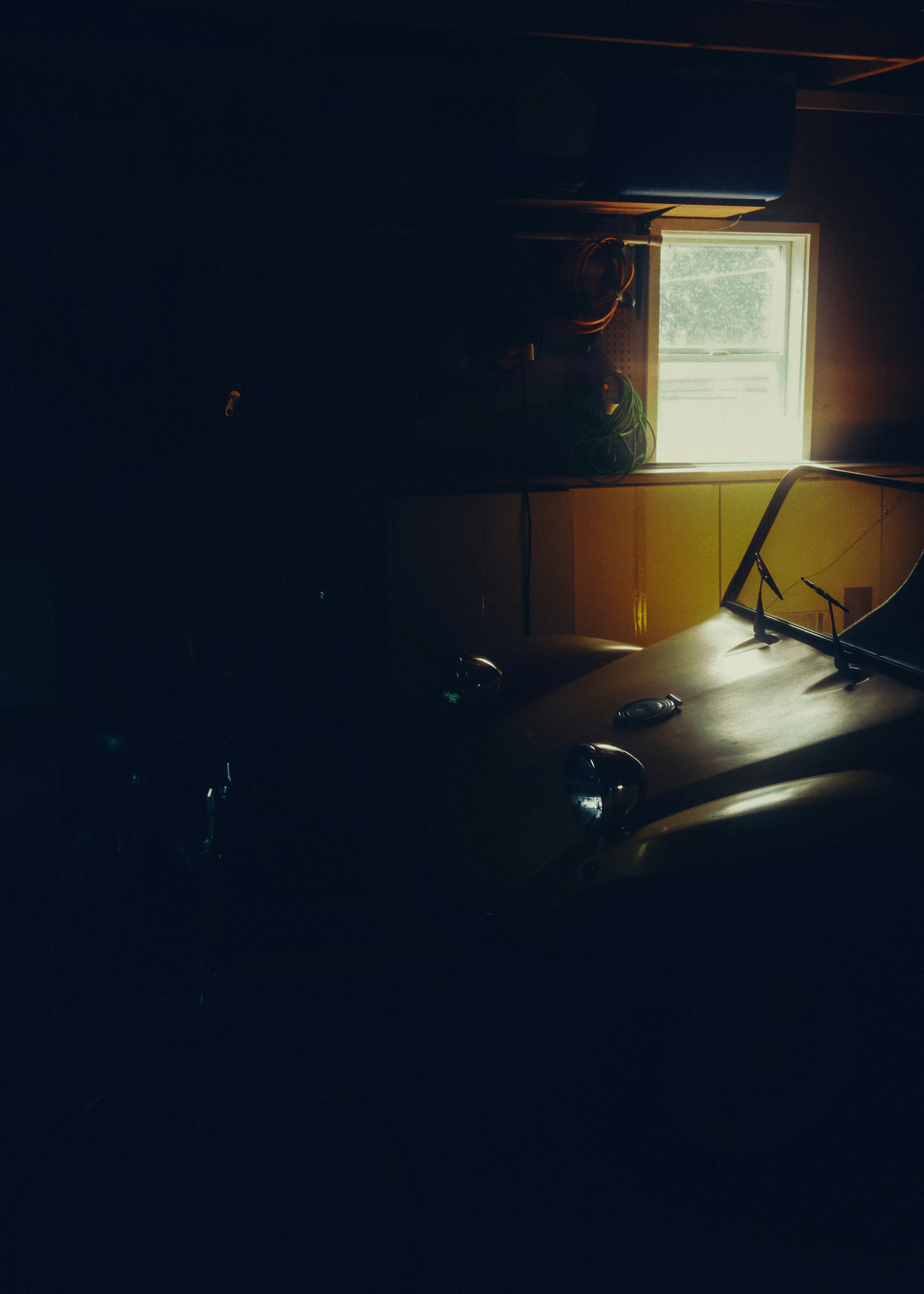 Glint of Light on a Quiet Workshop Car