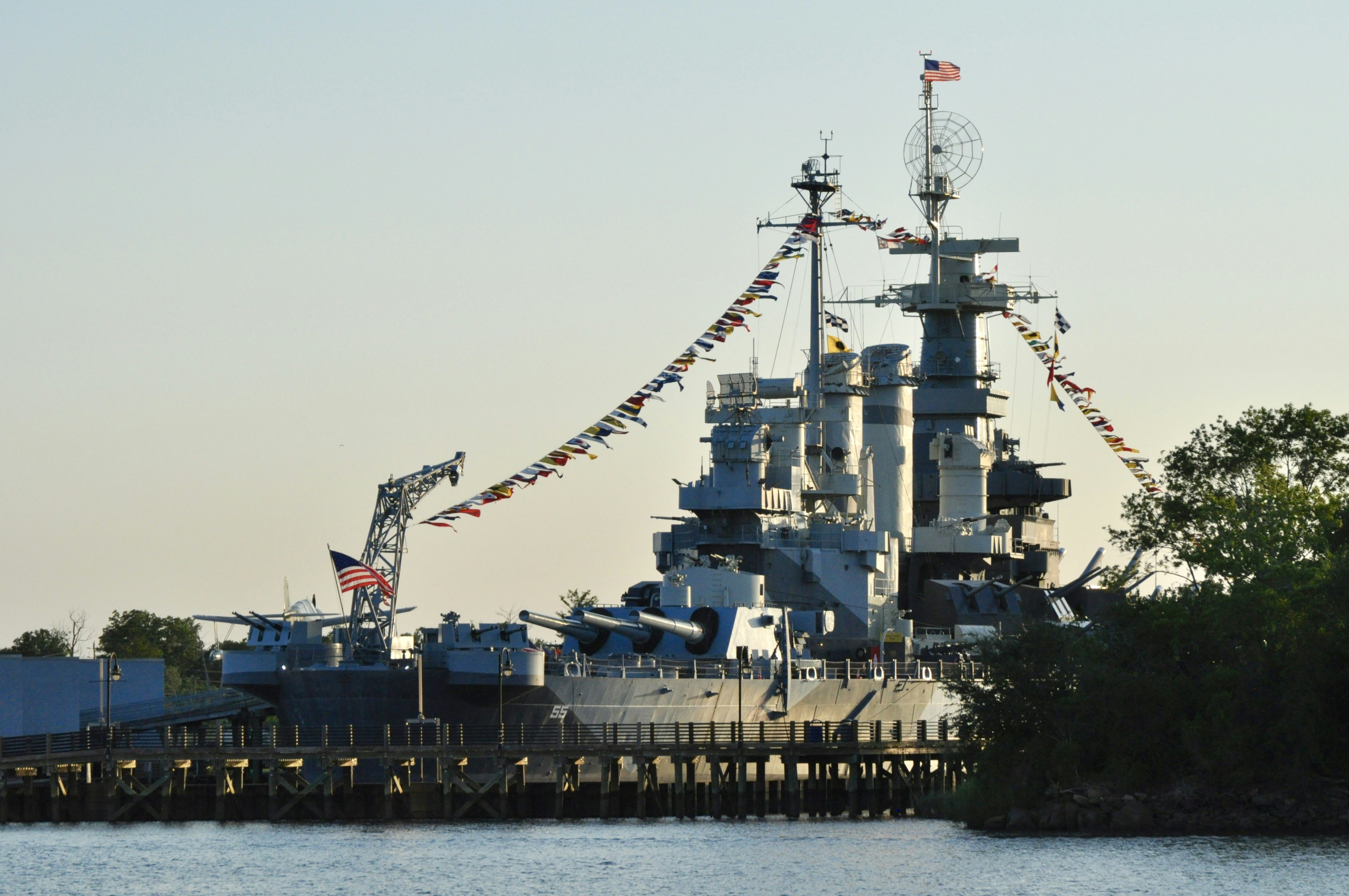 Battleship at Dusk: Flags, Antenna, and Steel