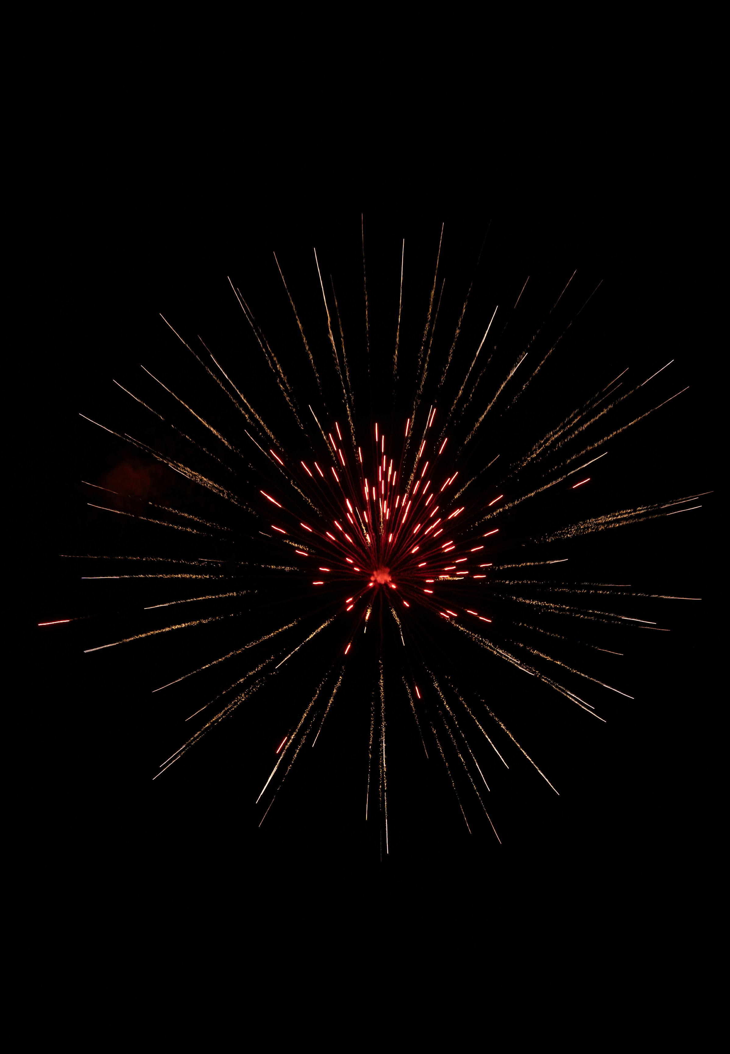 Red Orb Ignites Midnight Sky