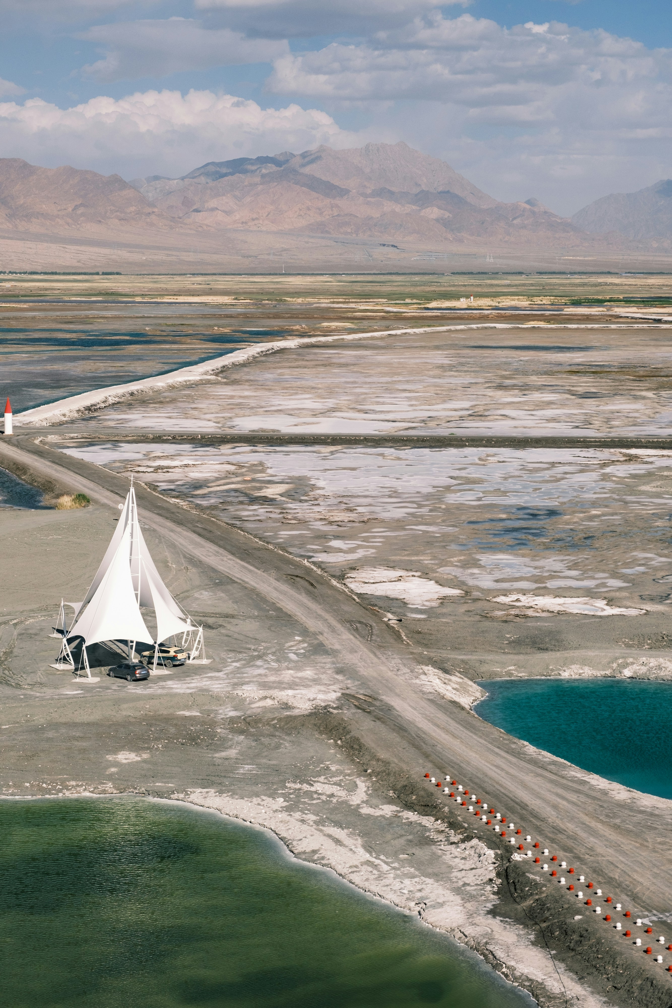 The White Canopy Over Scarred Ground by a Desert Salt Flat