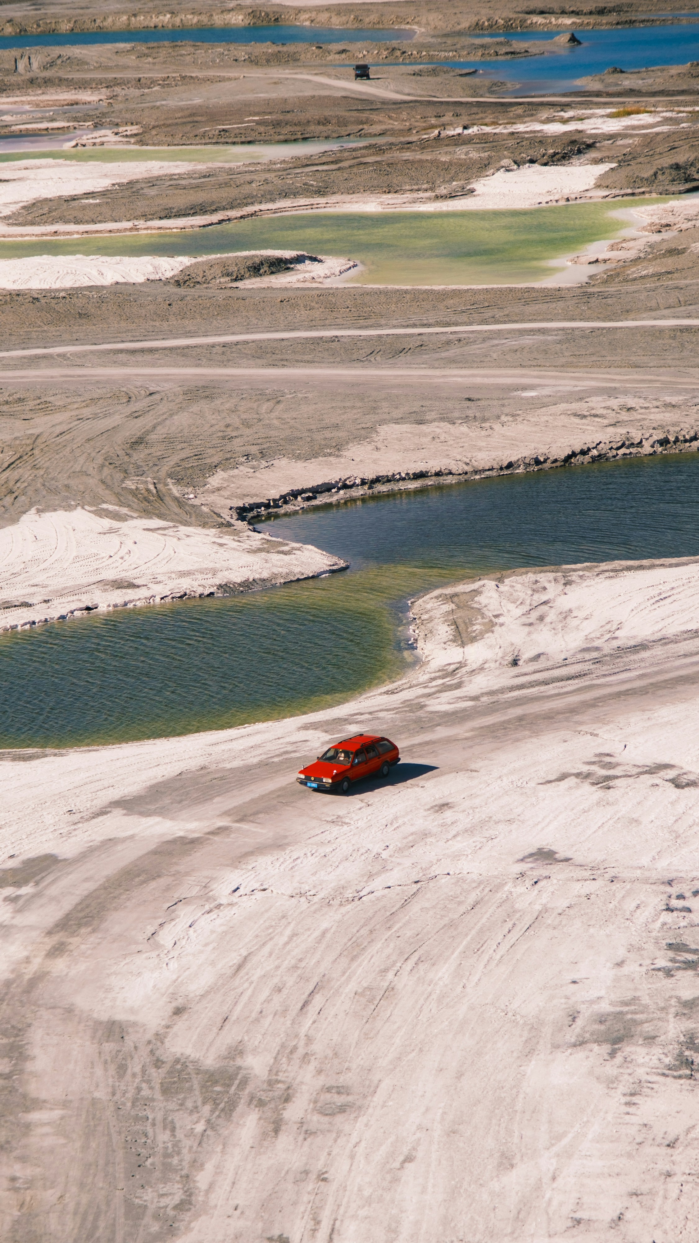 Red Compass in a Salt-Tculpted Horizon