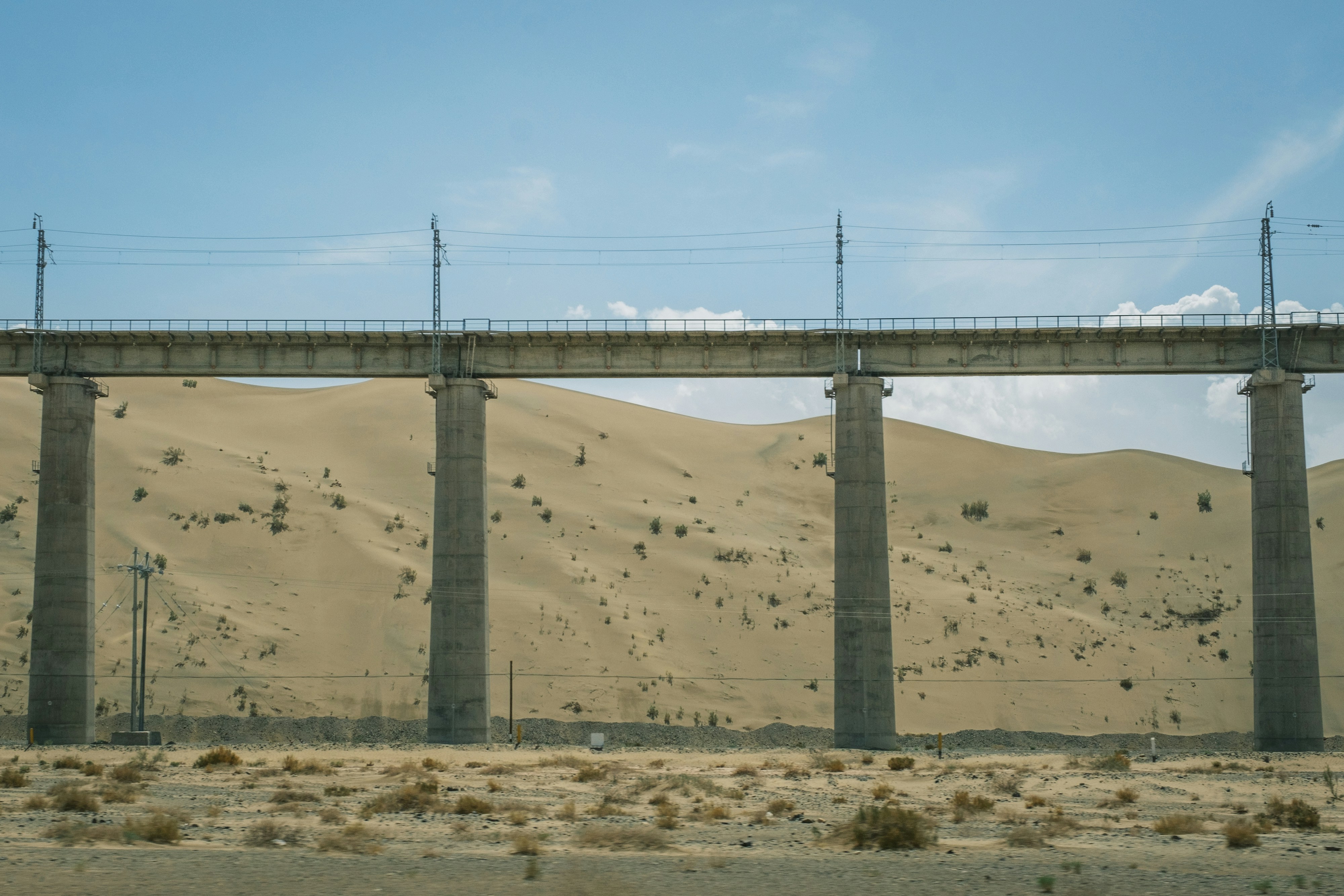 Concrete Giants Crossing the Dune Sea