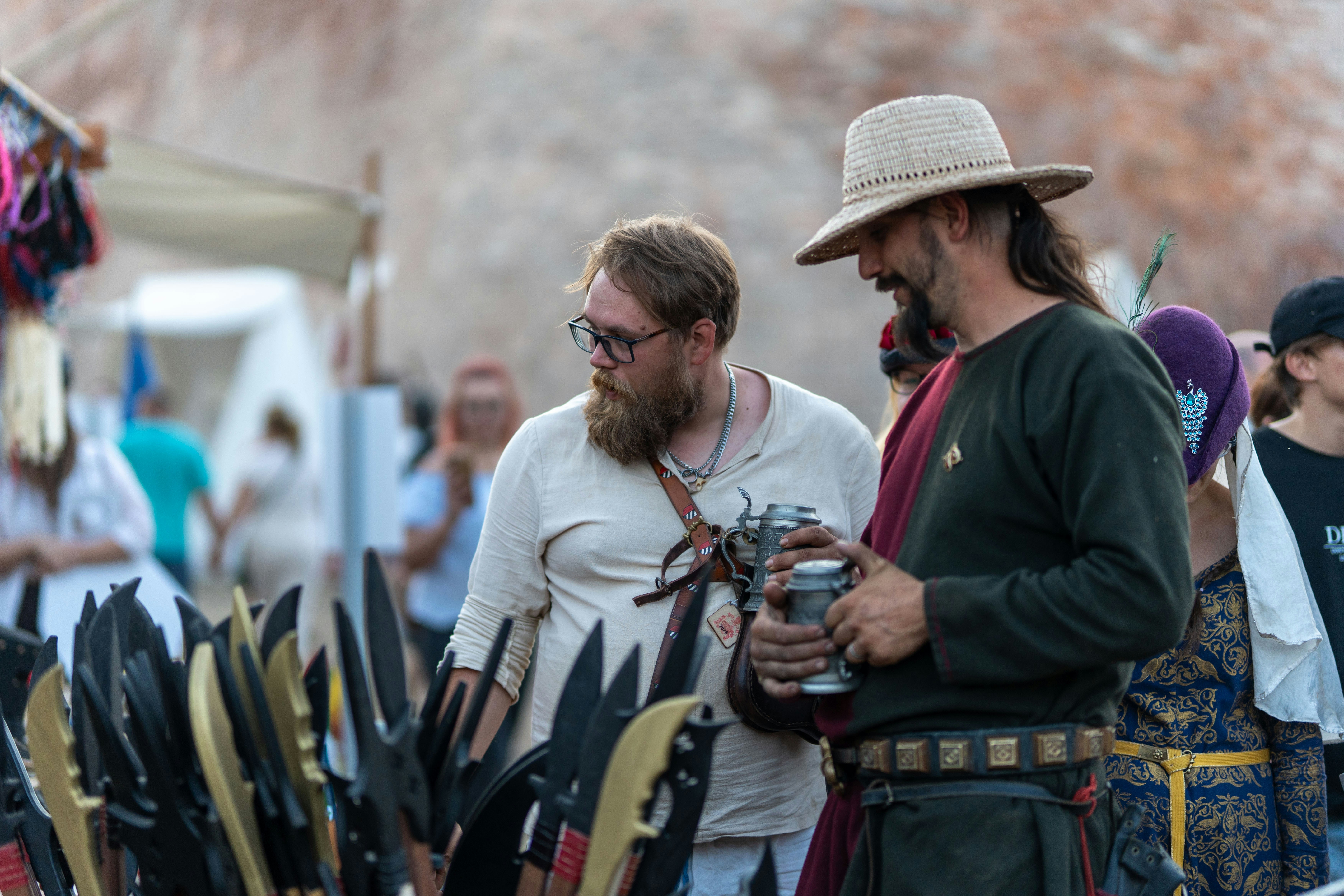 Bearded Merchant and Wise Warrior at the Market of Blades