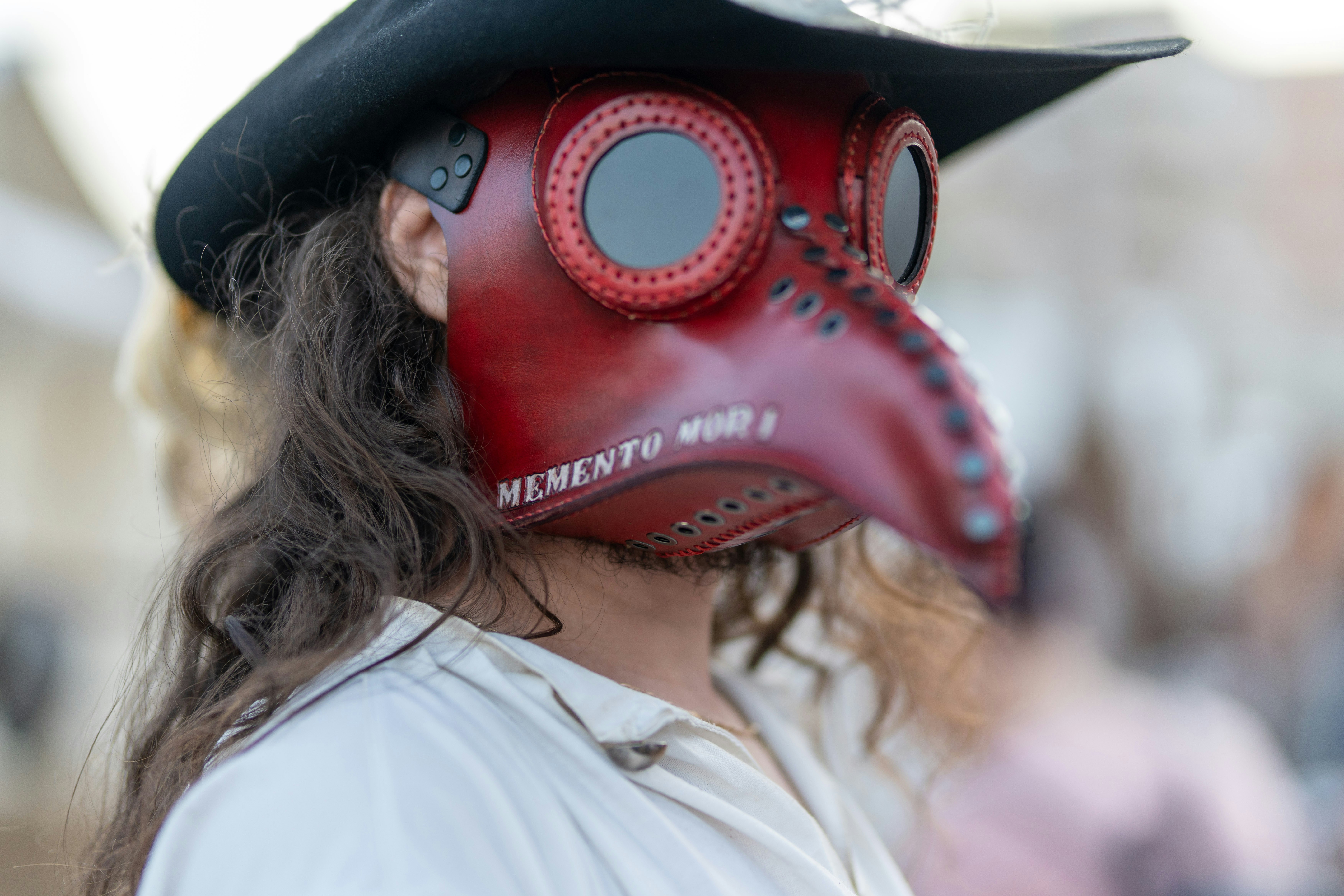 Mask of Memory: Red Plague Doctor in a Suburban Moment