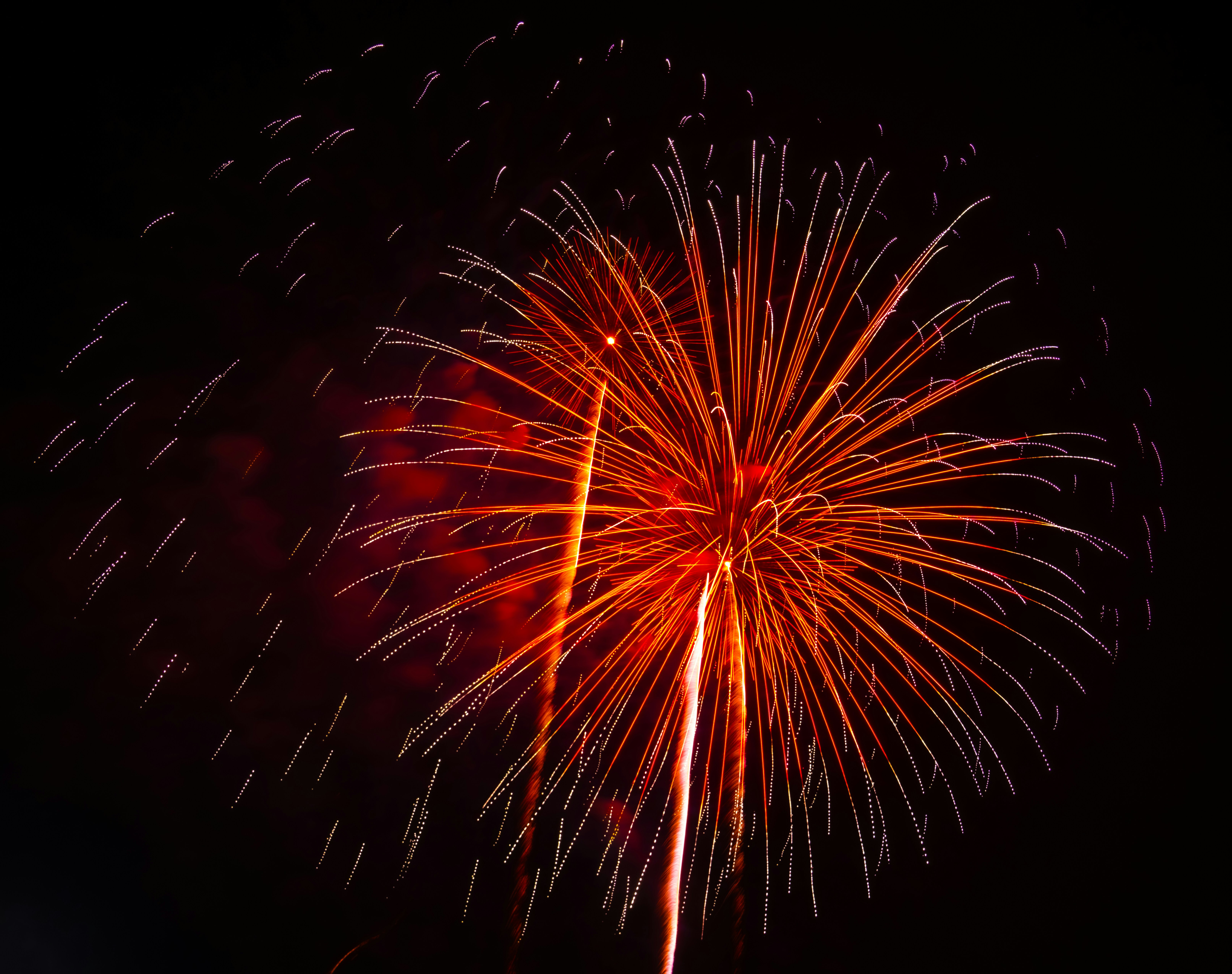 Ignition Kernel: Red-Orange Firework Bloom Against Night