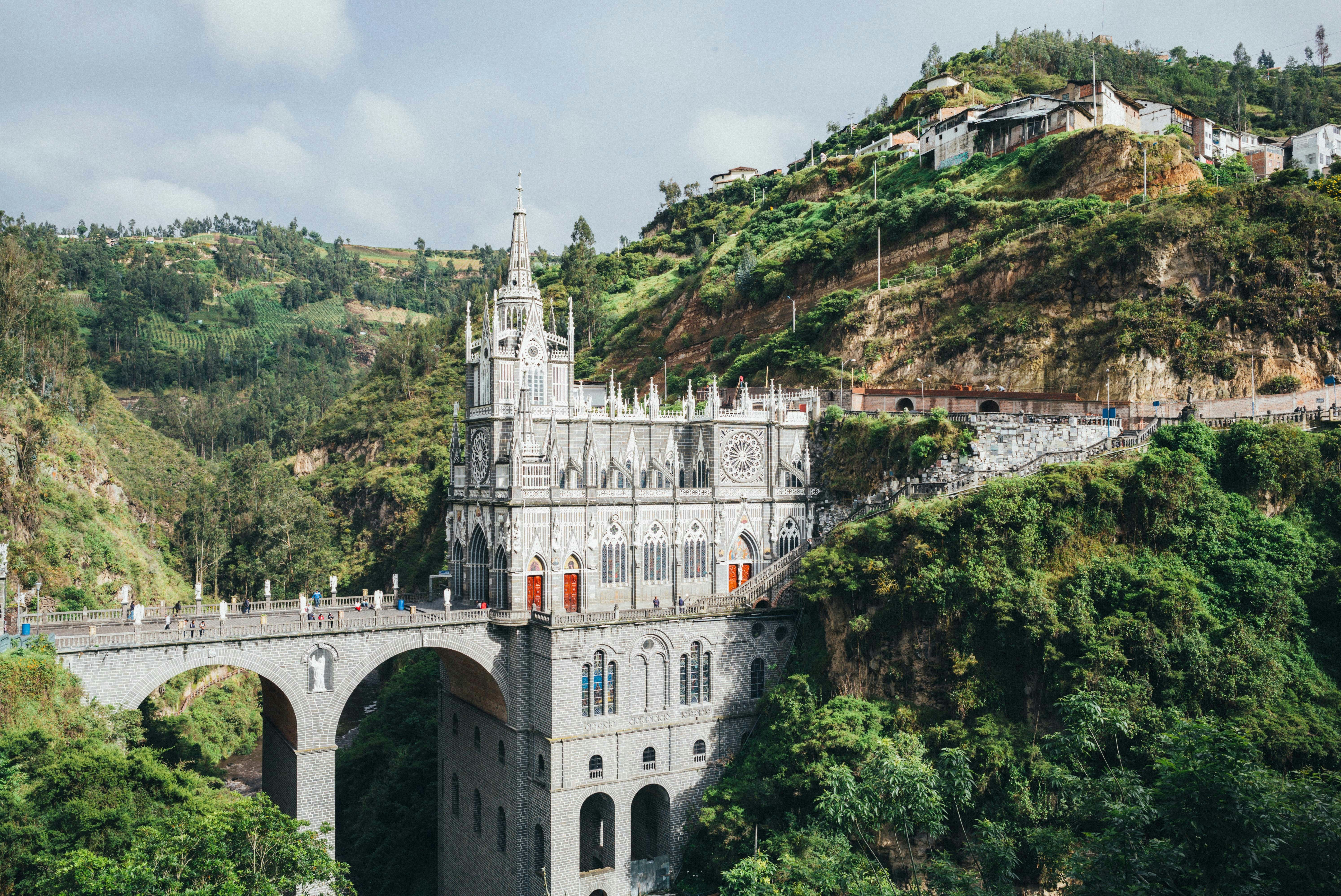 Stairway to the Sky: A Gothic Chapel Bridge Between Hills