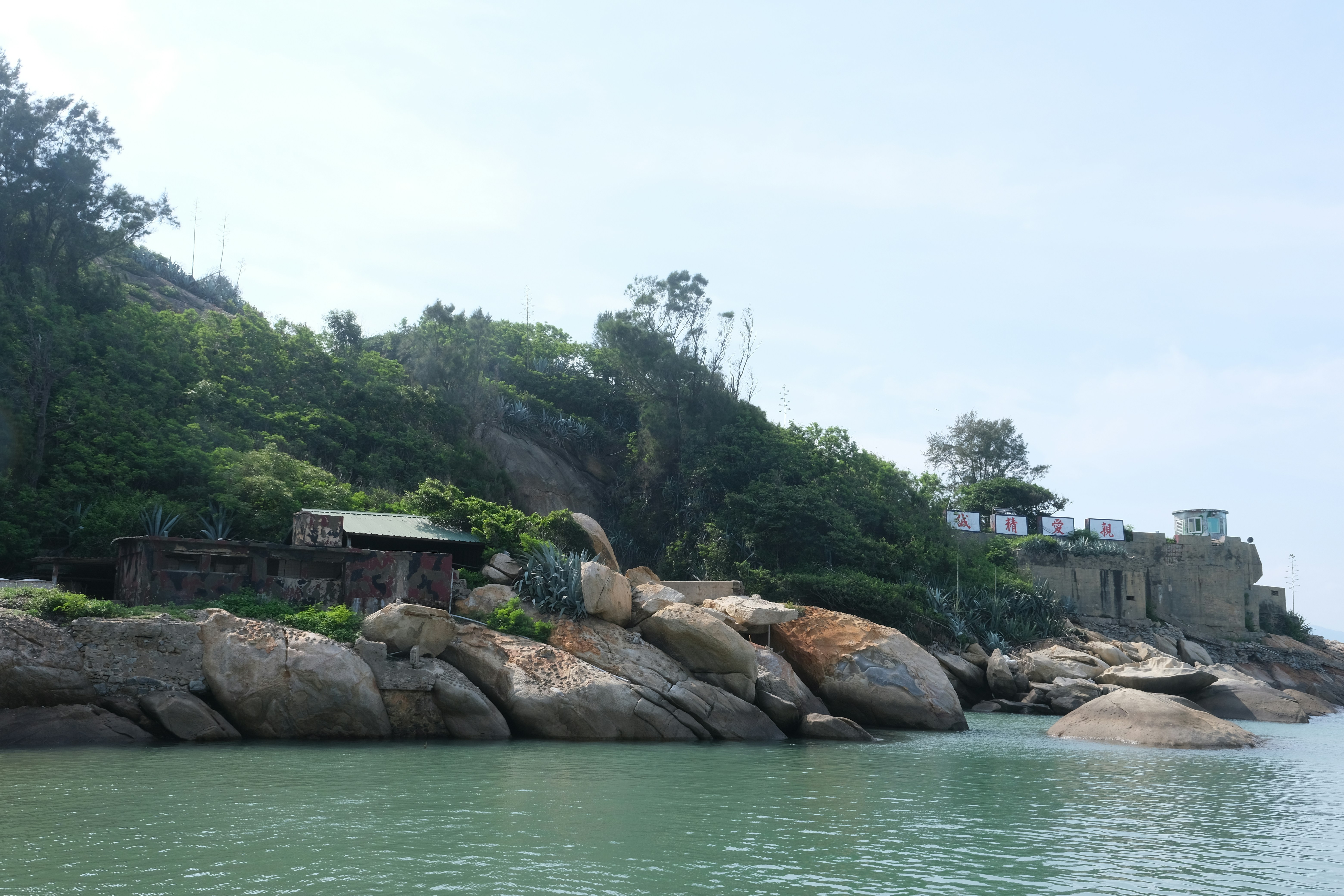 Rugged coastline settlement perched on weathered granite
