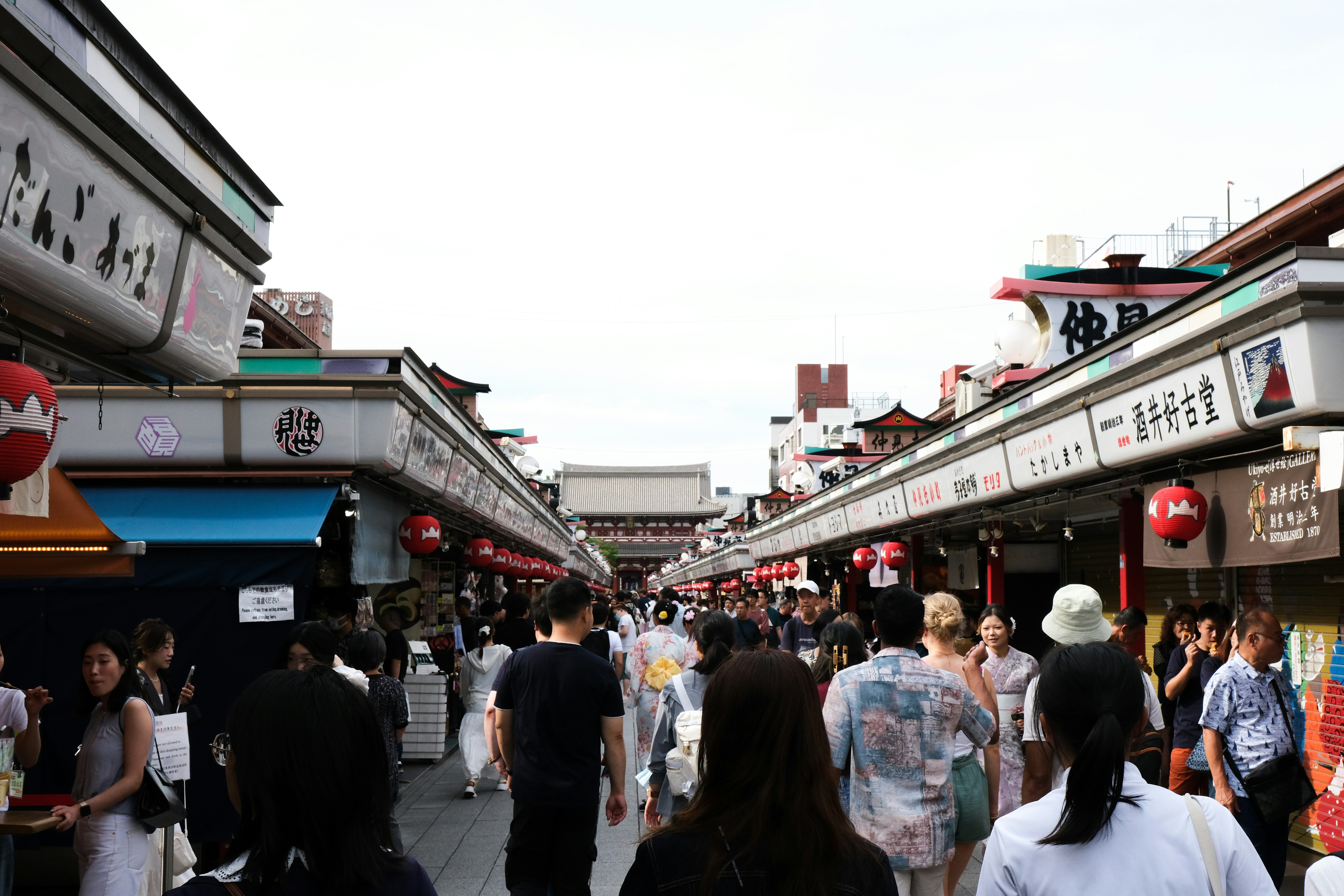 Crowded Market Alley: Faces, Lanterns, and Lantern Saints