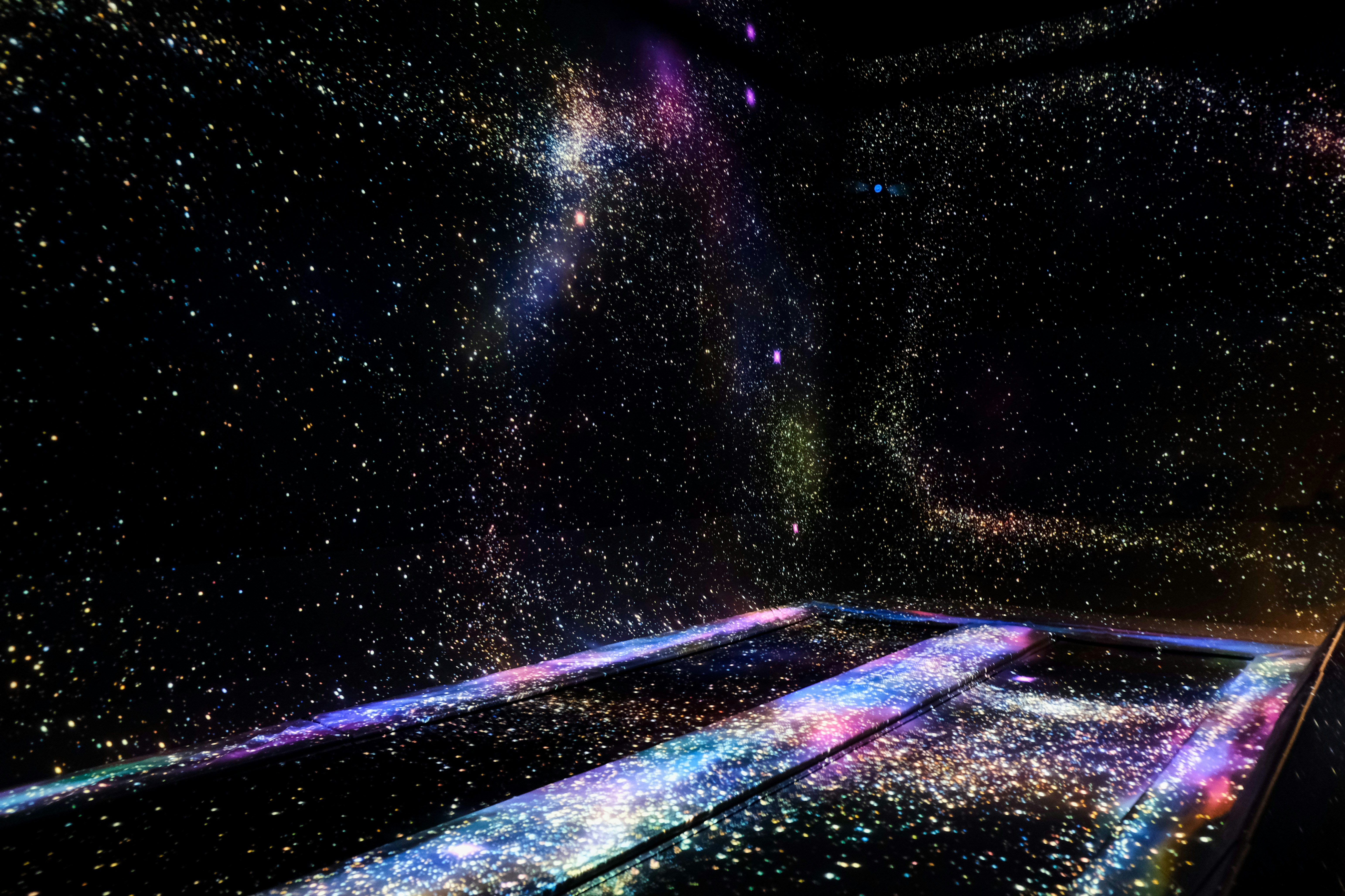 Cosmic Planks: A Stellar Pathway Across a Nebulous Deck