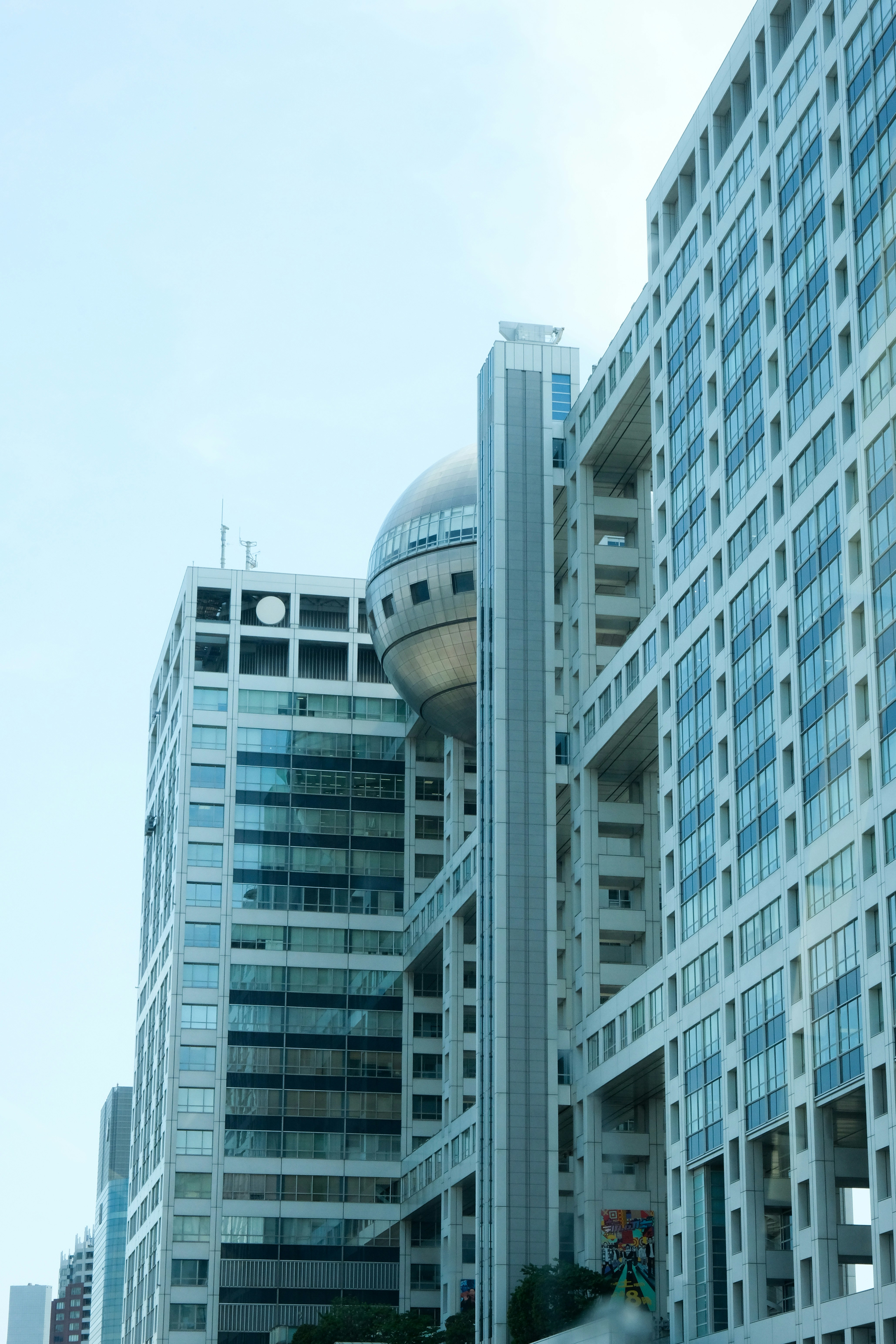 Skyward Reach: The Tower Sphere Adjoins a Modern Atrium