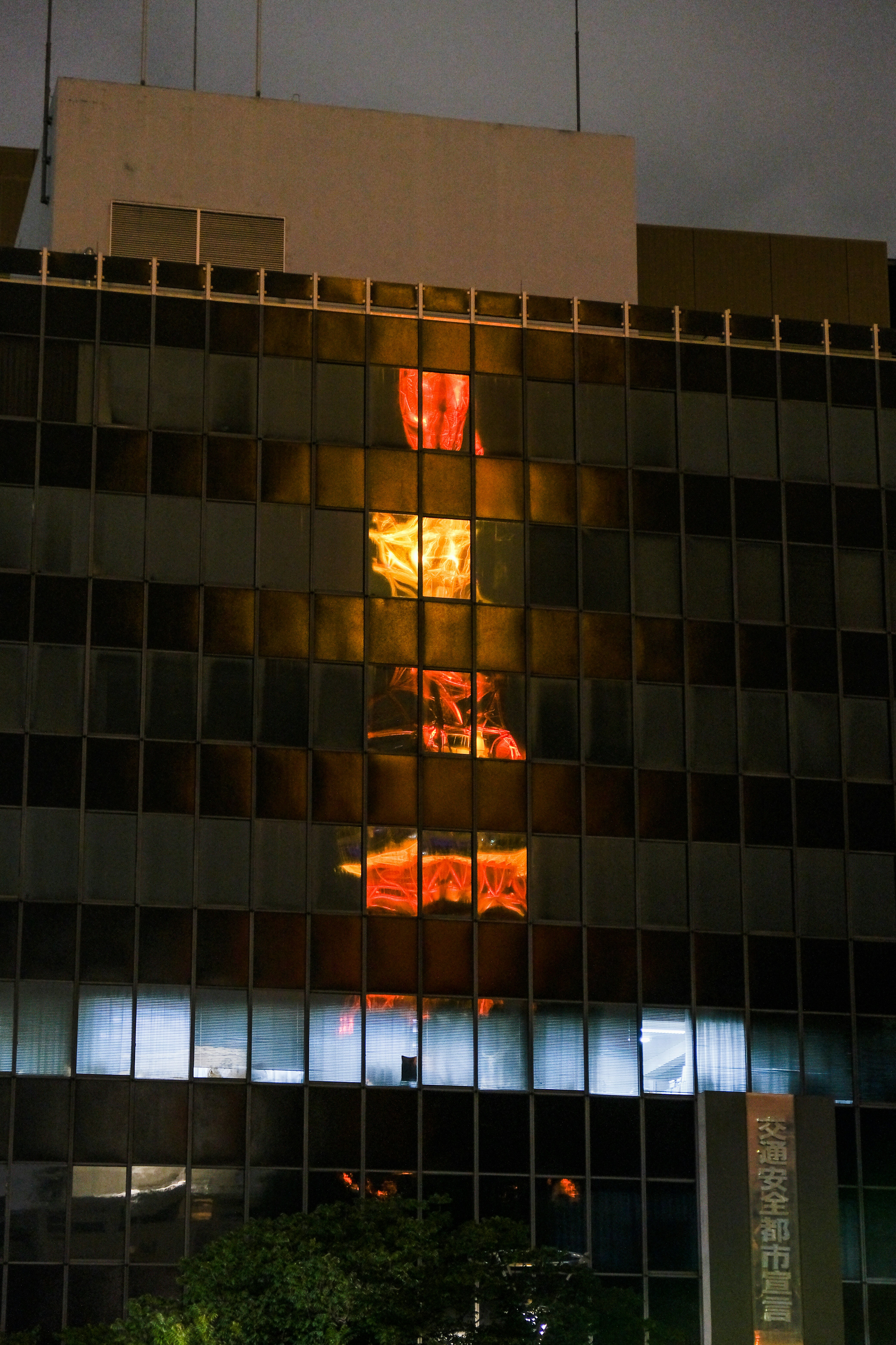 Twin Flames Behind Glass: A Vertical Ember in Night Glass