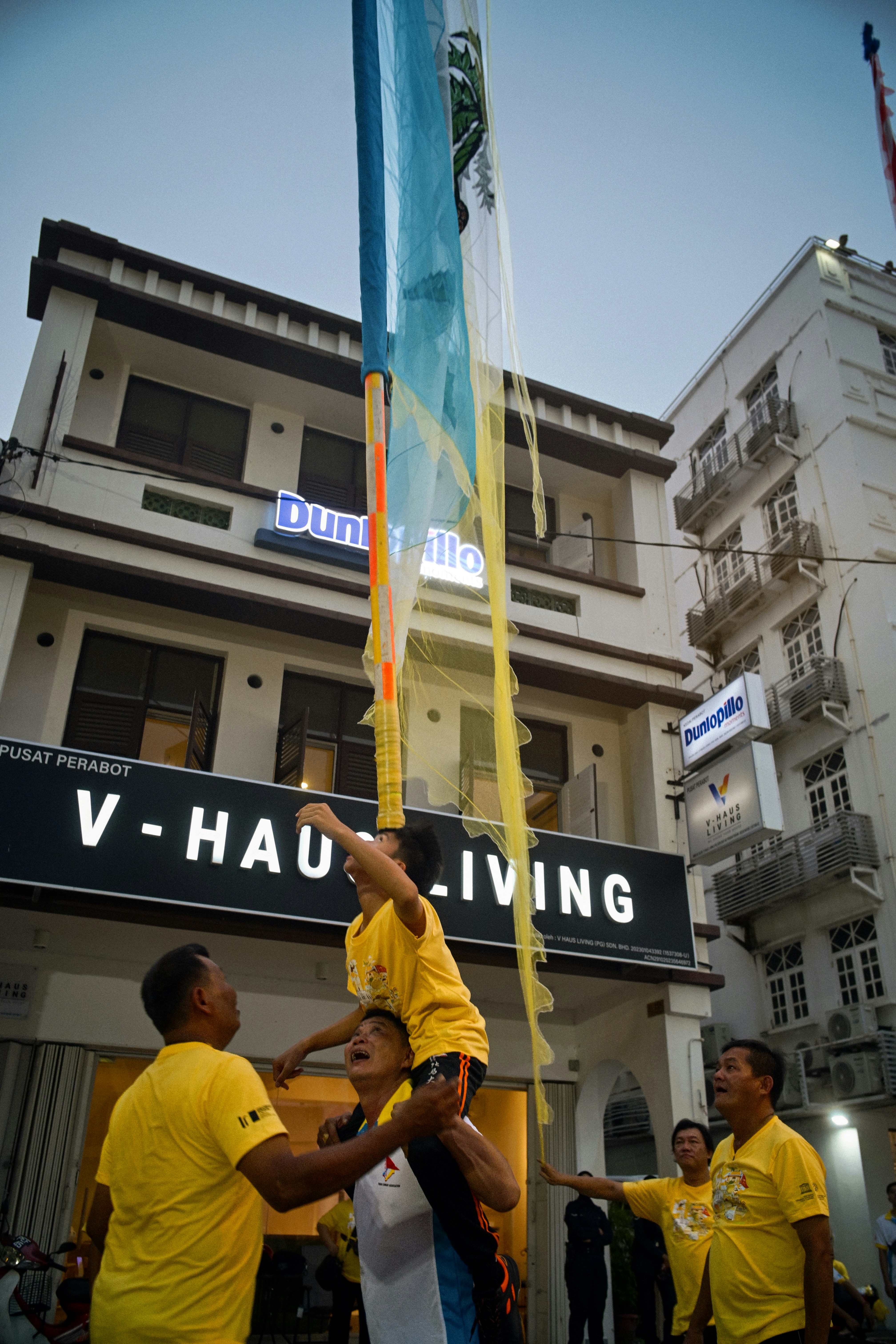 Flagpole in Motion: Youthful Energy in a Street‑Level Shoot