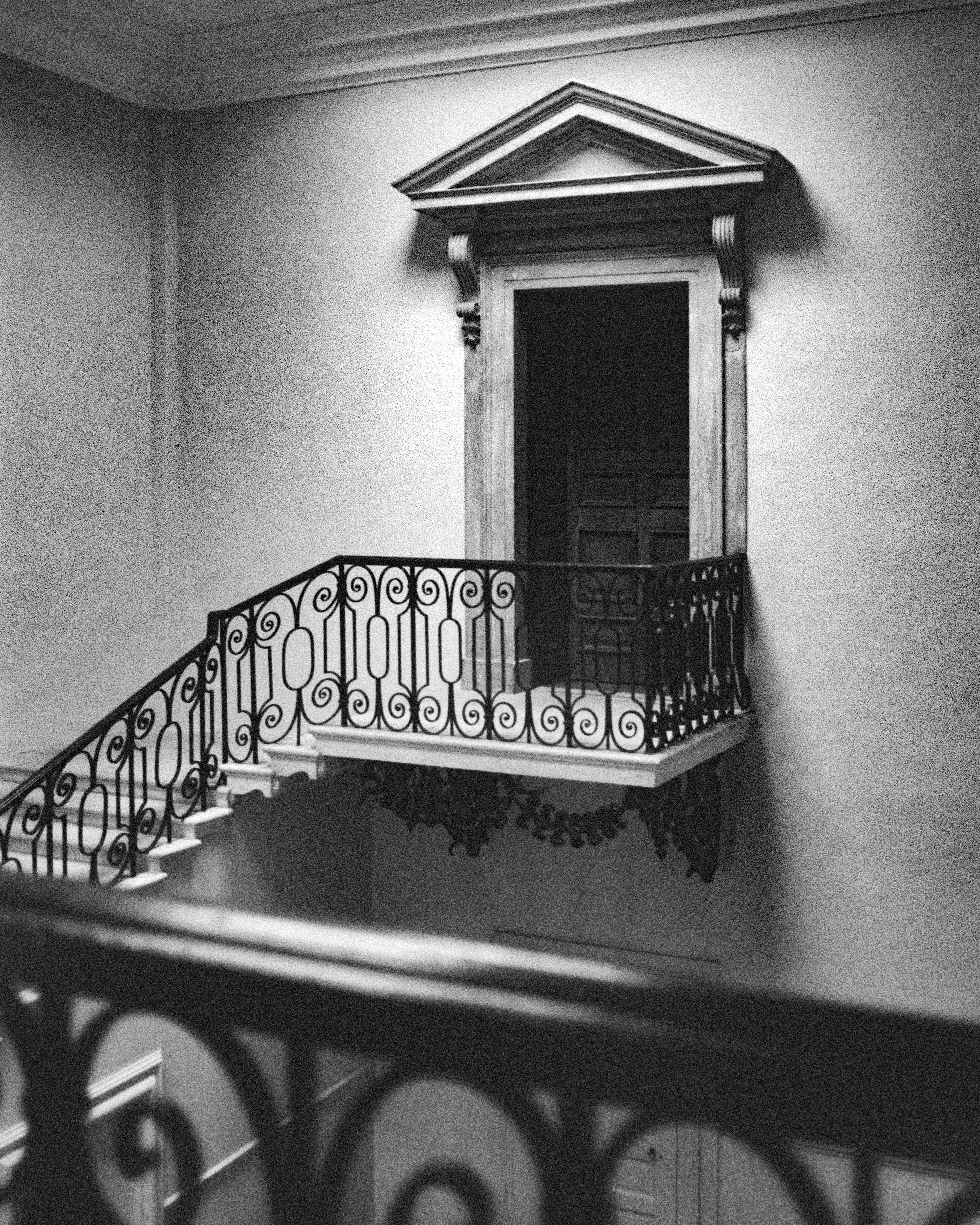 Dusty Balcony Gate to an Empty Doorway
