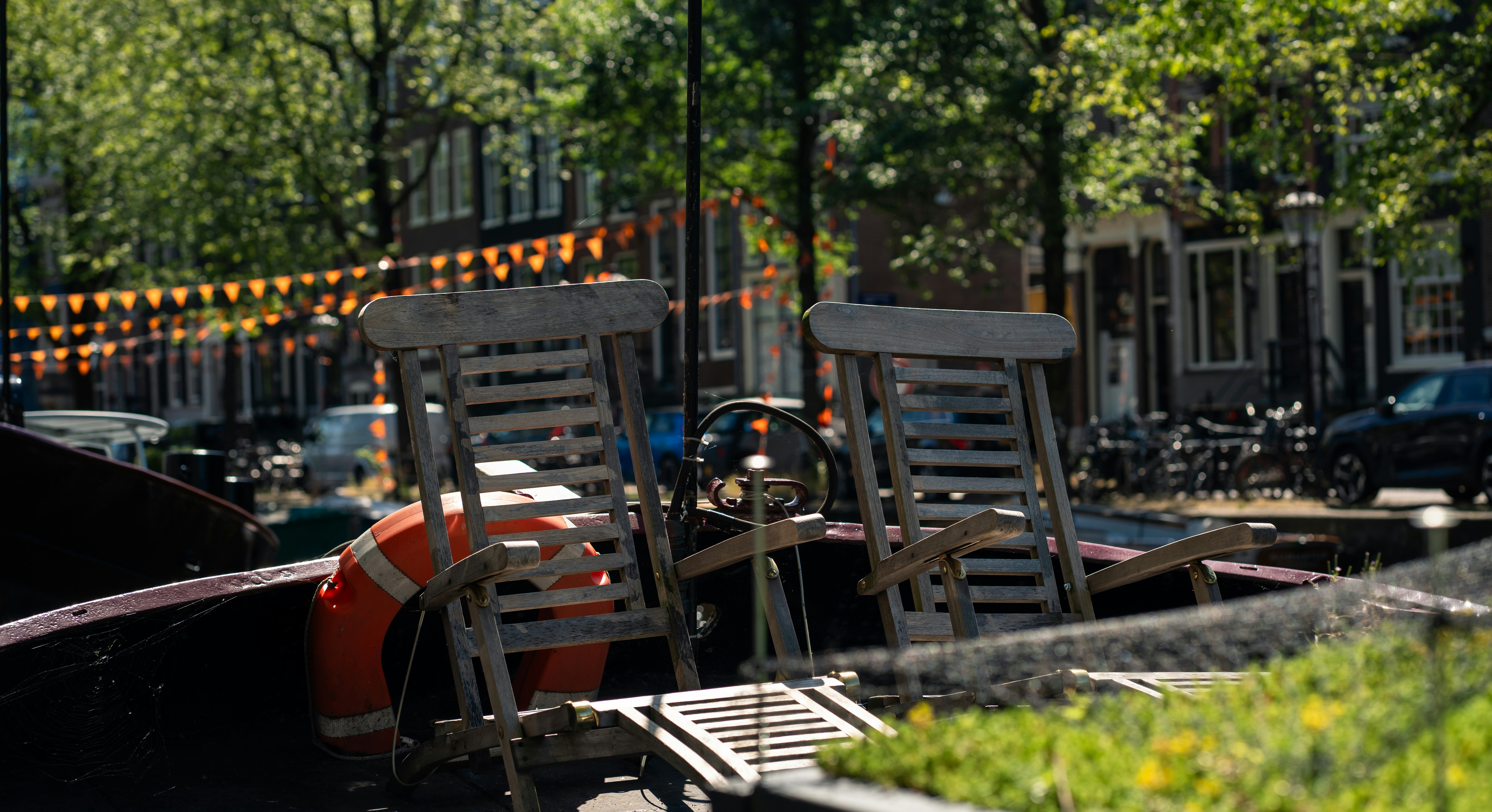 Quiet Riverside Chairs Under a Bugle Banner